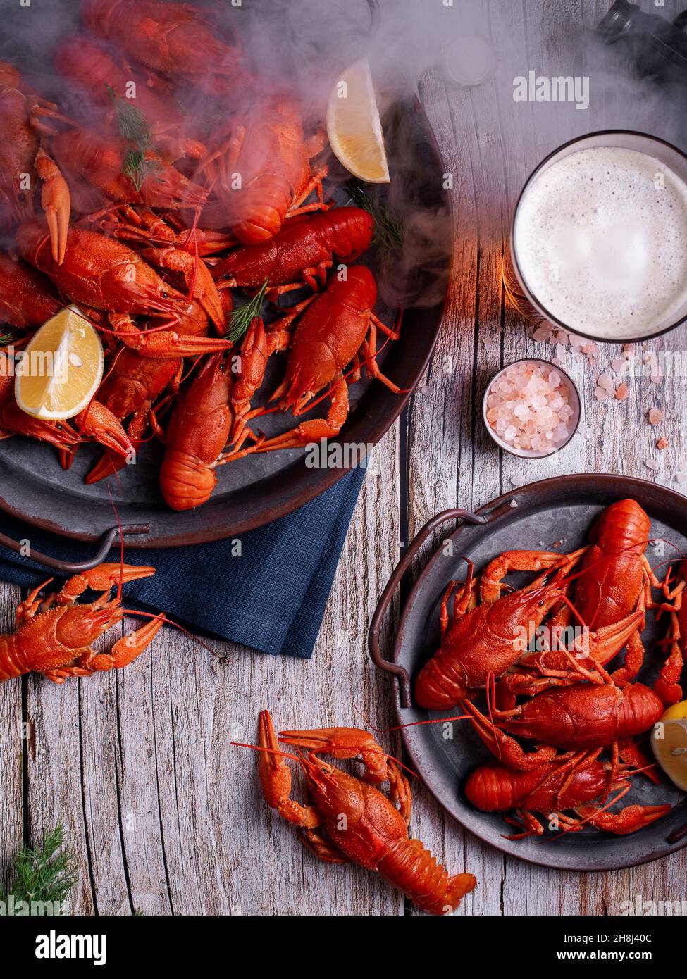 boiled crayfish with beer on a wooden background Stock Photo - Alamy