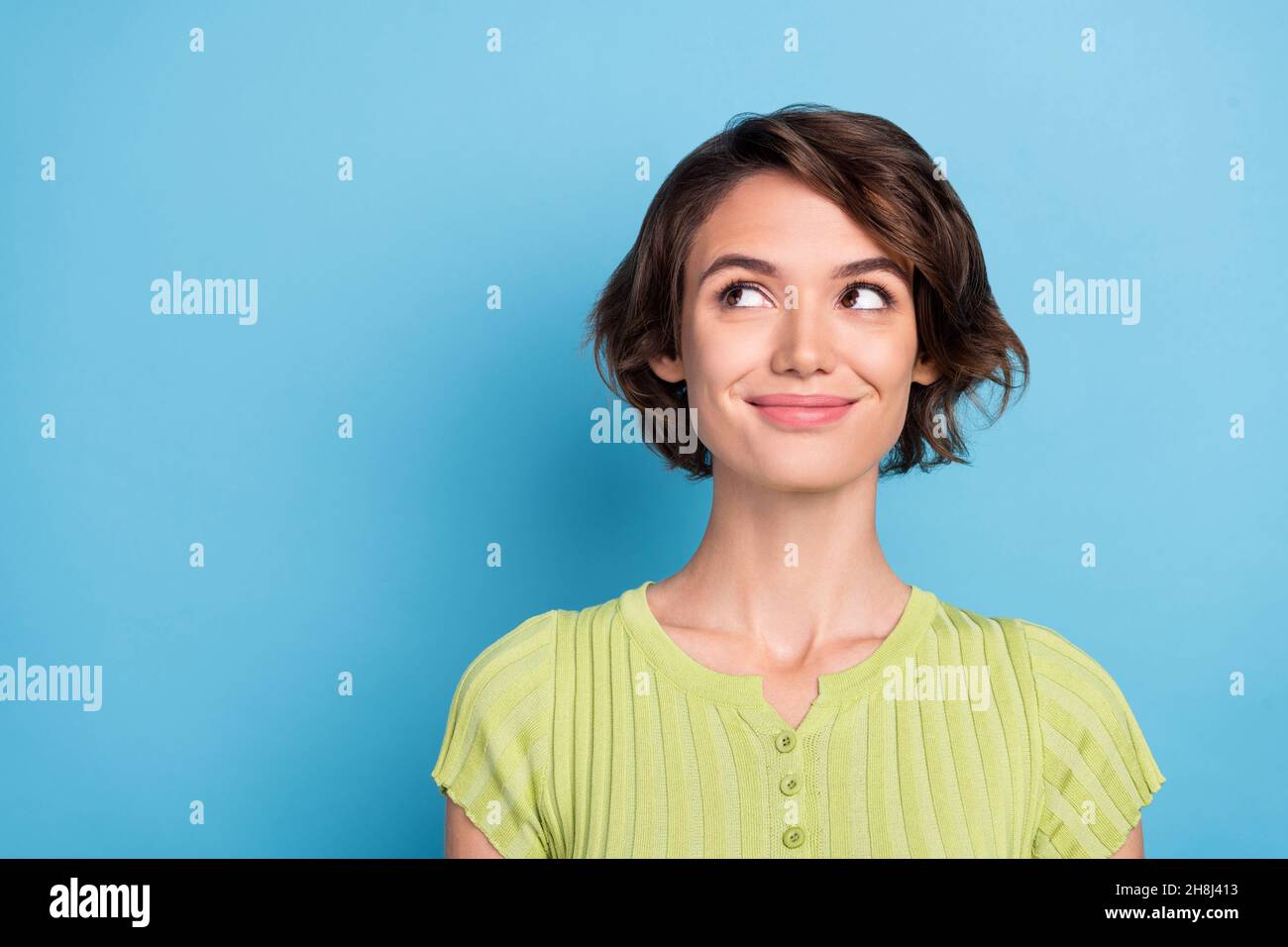 Photo of dreamy sweet young lady wear green t-shirt smiling looking ...