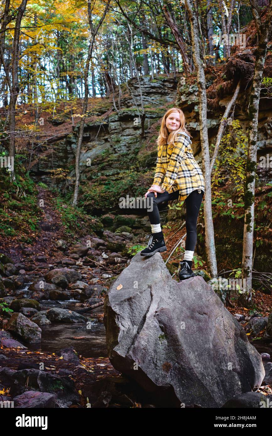 Red Haired Tween Girl Hiking in the Fall woods Stock Photo - Alamy