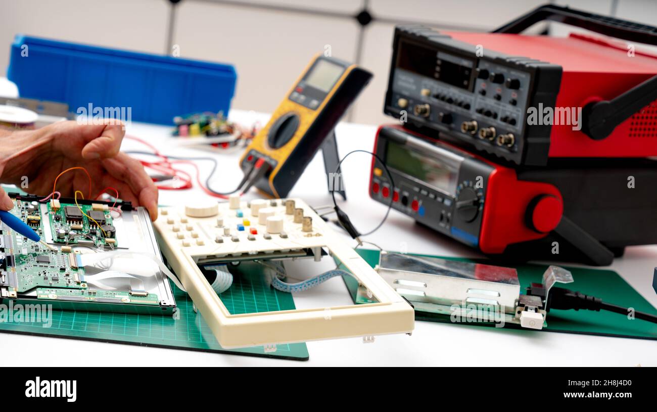 Repair of a medical measuring device in a laboratory Stock Photo - Alamy
