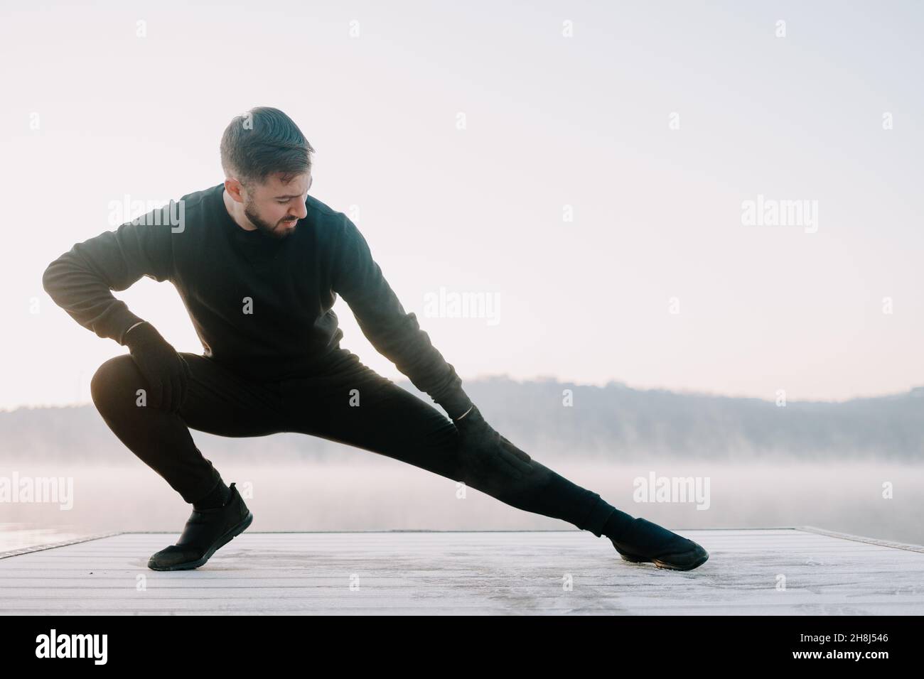 Man stretching in the morning Stock Photo - Alamy