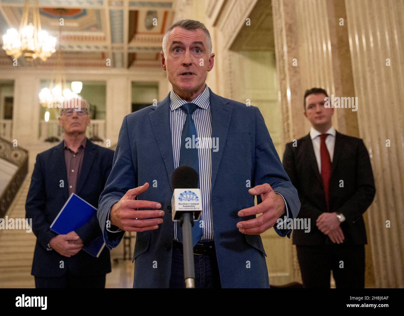 Sinn Fein National Chair-person Declan Kearney MLA (centre) with party ...