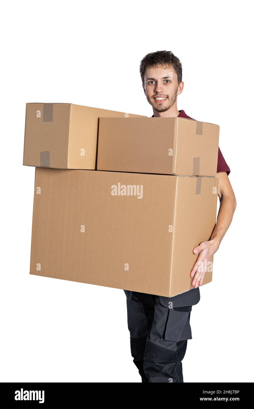 Delivery man with parcels . Handsome happy young delivery man holding ...
