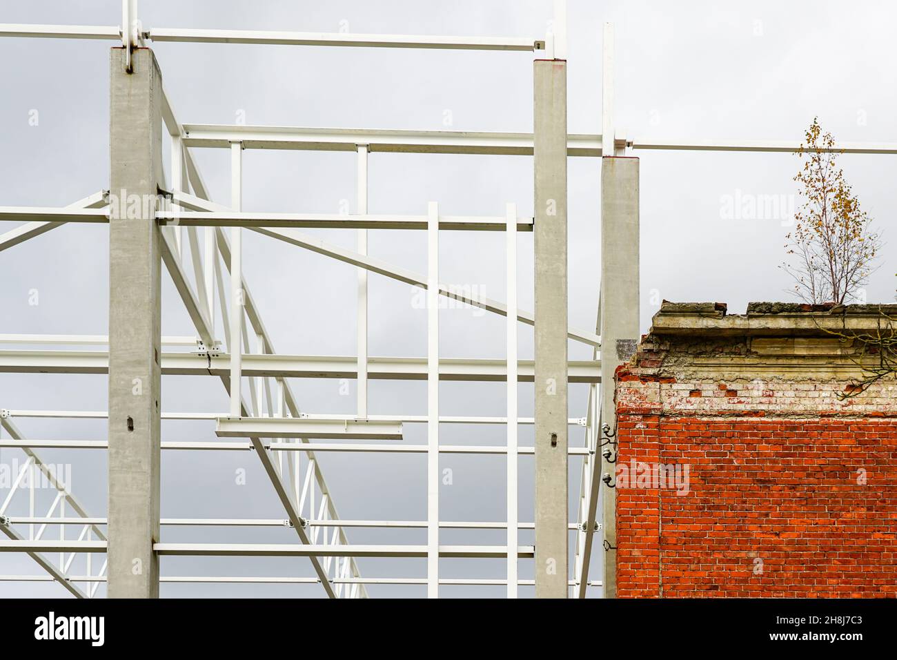 integration of the facade of the old brick building into a new modern ...