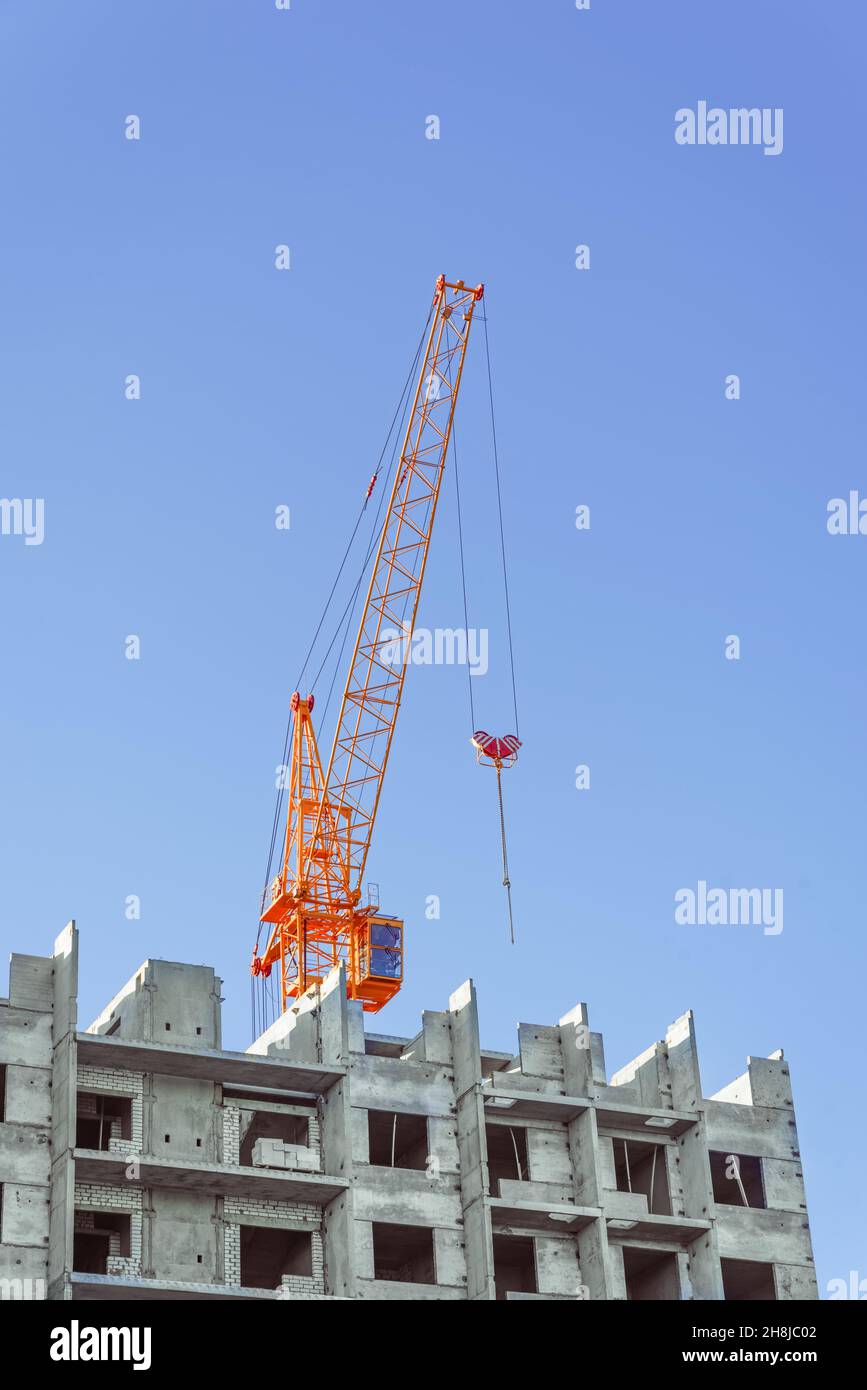 Hoisting tower cranes and construction of high-rise building Stock ...