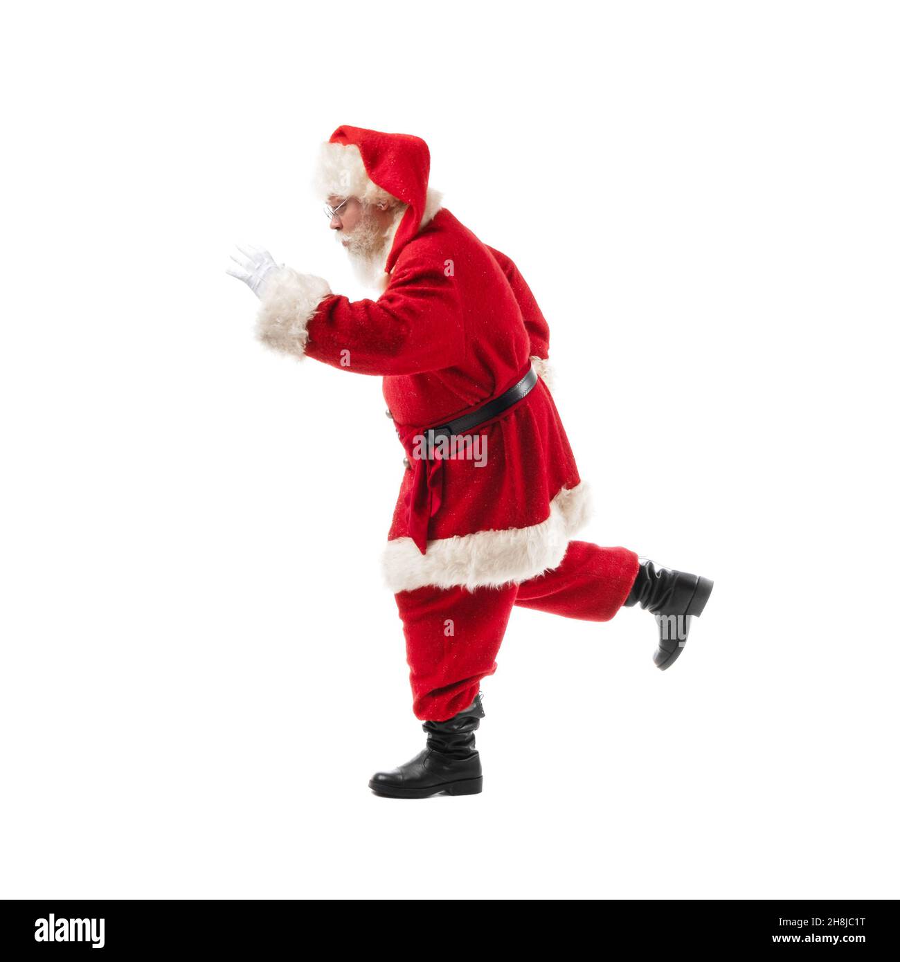 Happy running Christmas Santa isolated over white background Stock ...