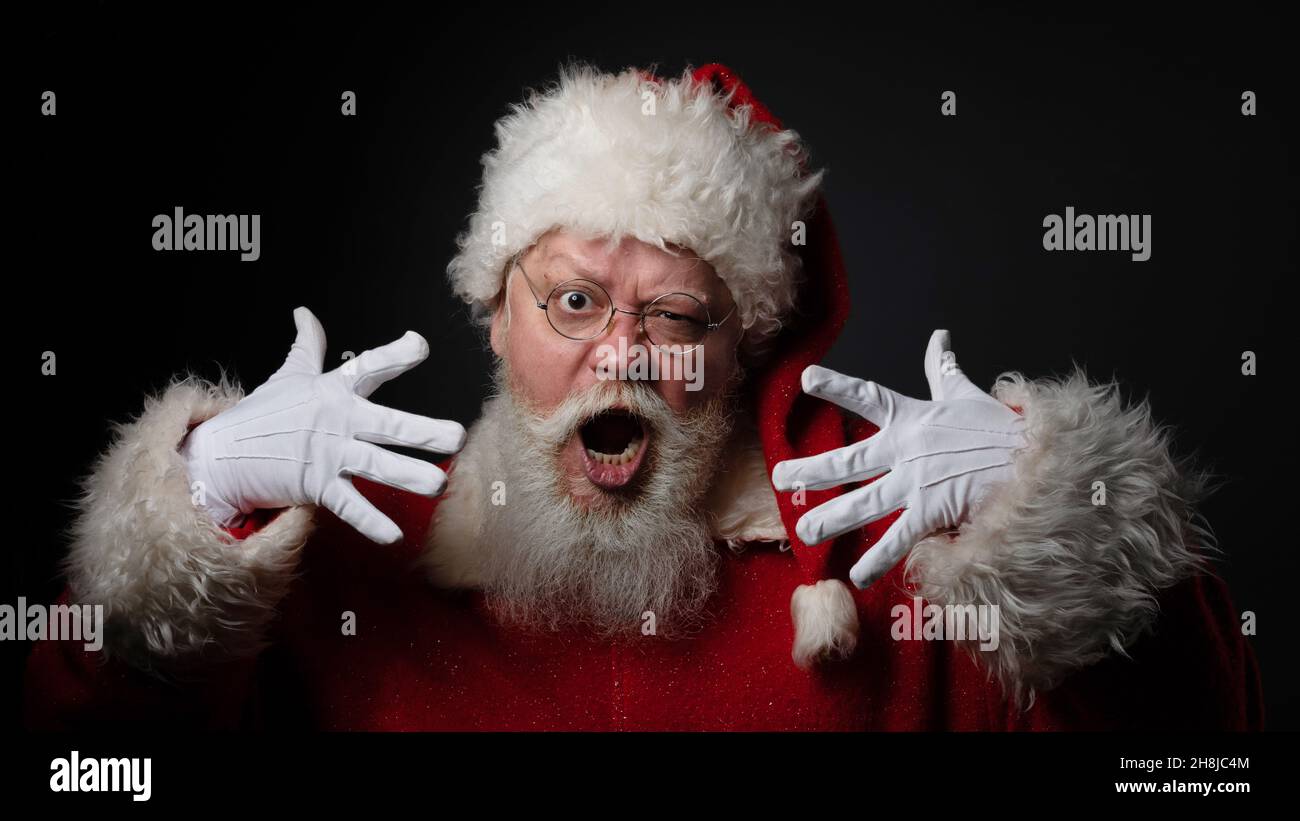 Funny Santa Claus shout and gesture explaining rules , black background ...