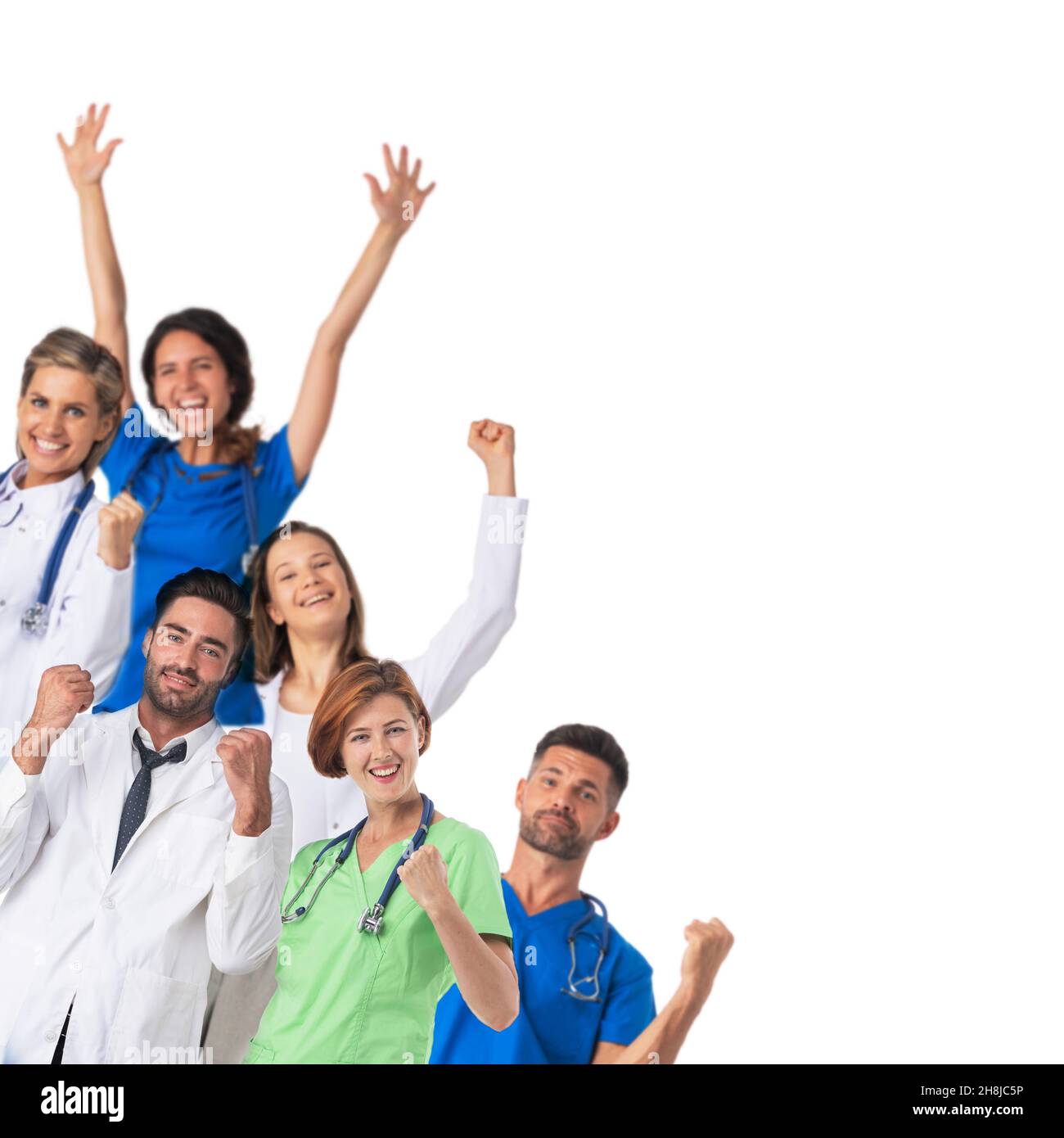 Diverse medical team of male and female doctors and nurses celebrating ...