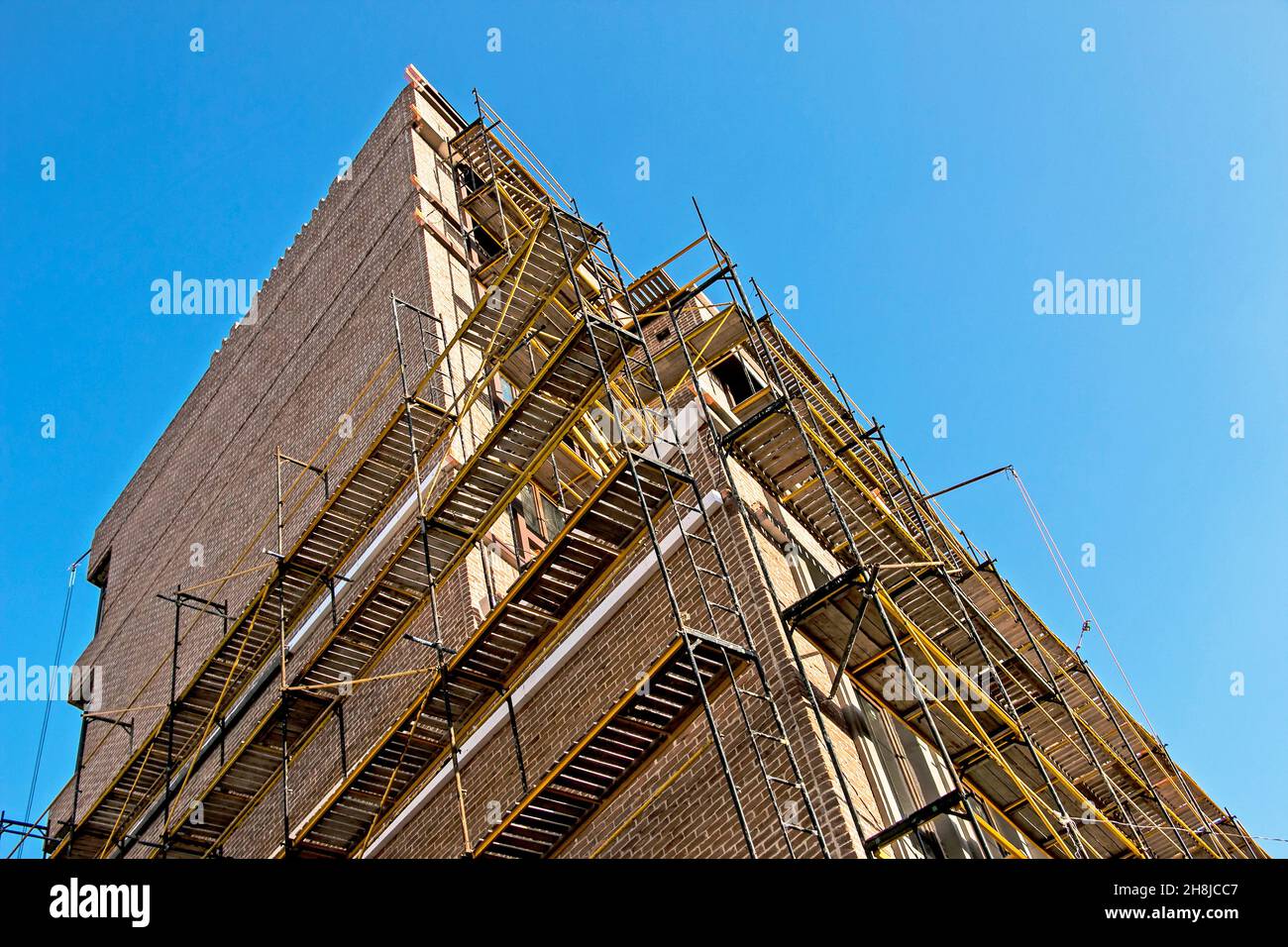 Scaffolding is used as a temporary structure to support the structure ...
