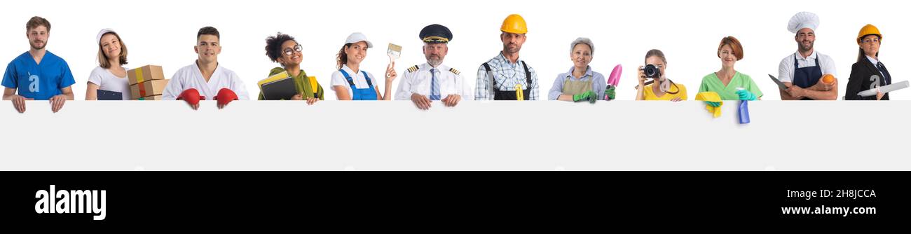 Group of diverse profession workers holding together empty banner ...