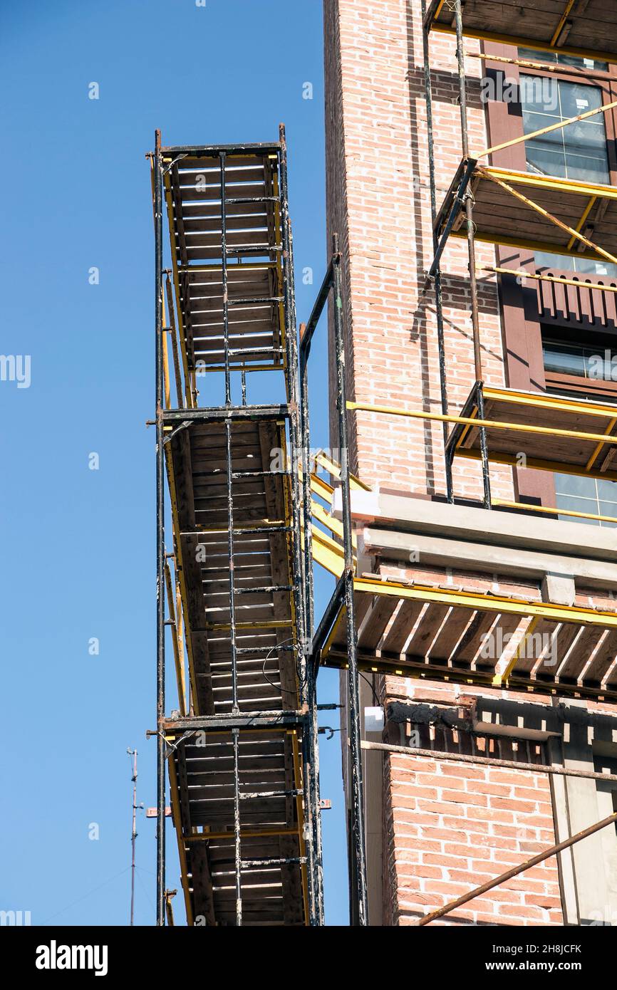 Scaffolding is used as a temporary structure to support the structure ...