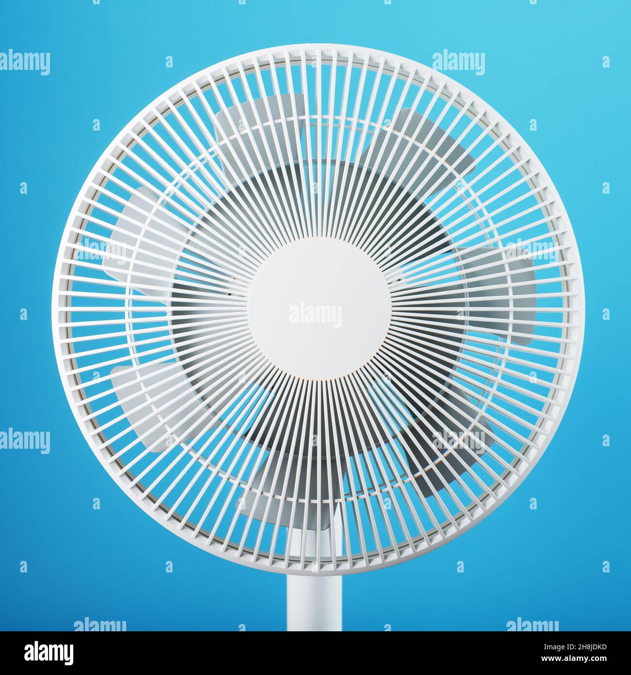 A high-tech white electric fan with a modern design for cooling the ...