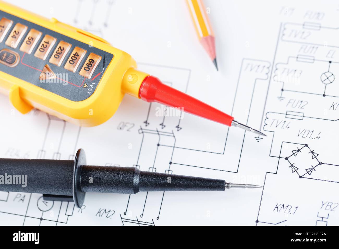 Yellow tester for step-by-step voltage indication on the electrical ...