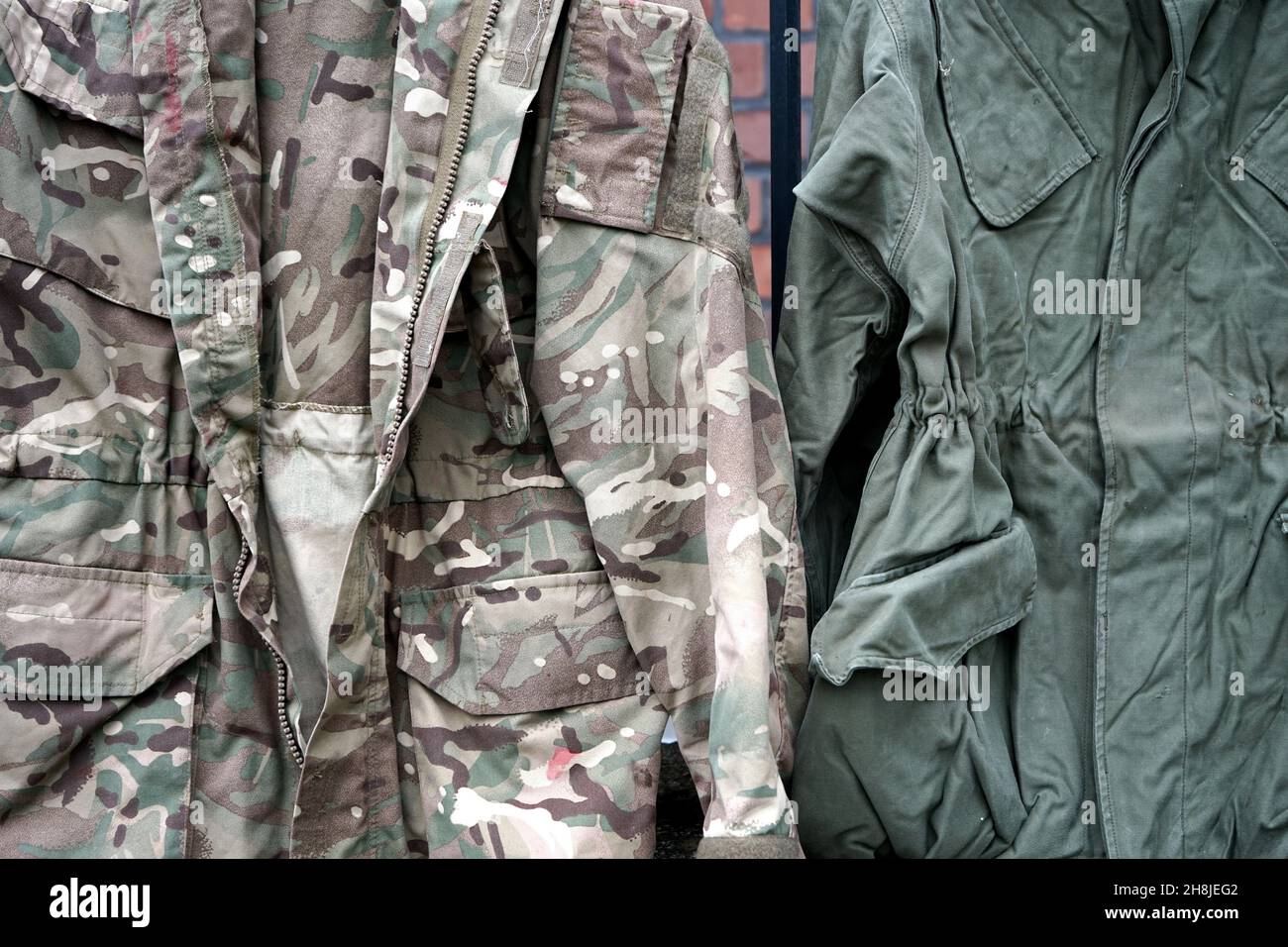 Closeup of an English military uniform hanging on the wall Stock Photo ...