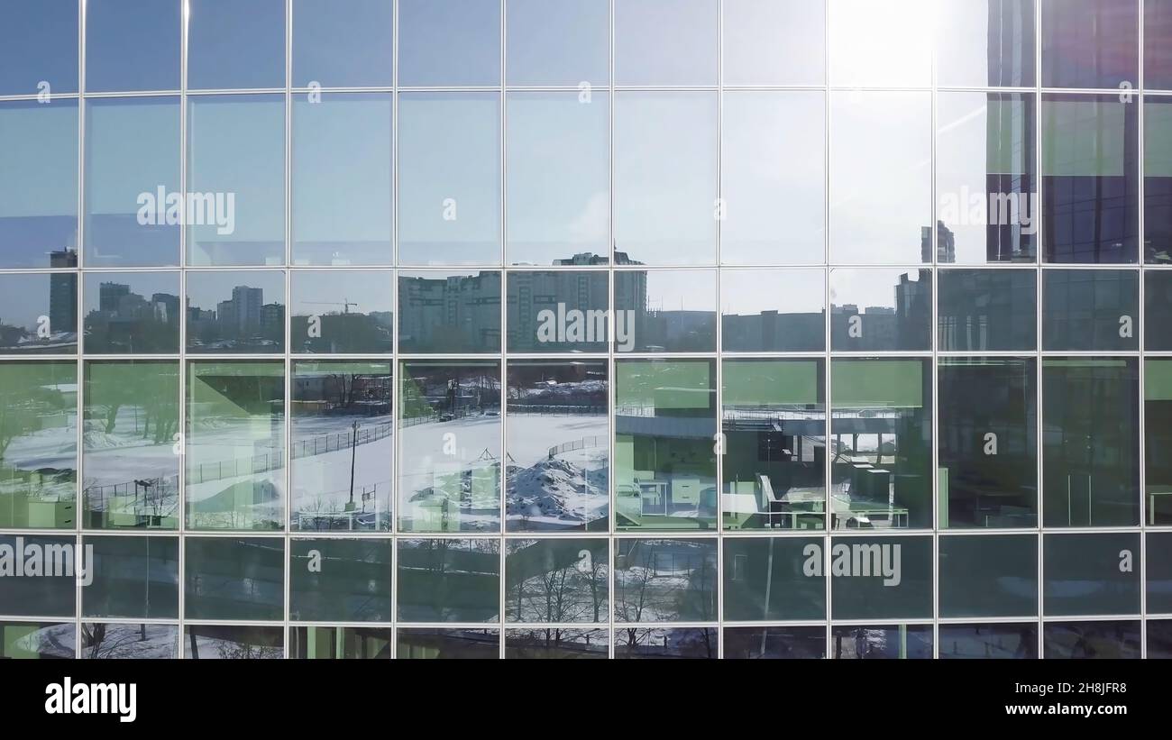 Office building windows background. Buildings reflected in windows of ...