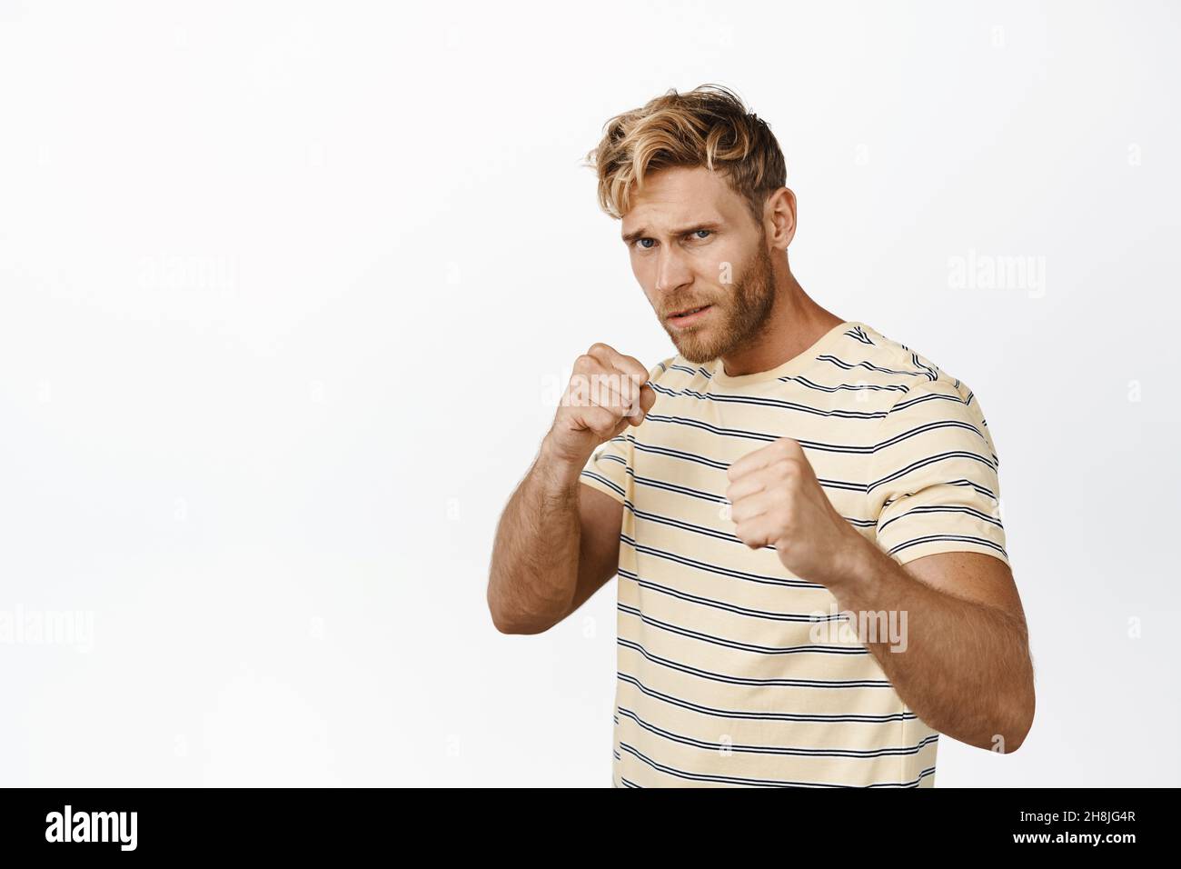 Macho pose hi-res stock photography and images - Alamy