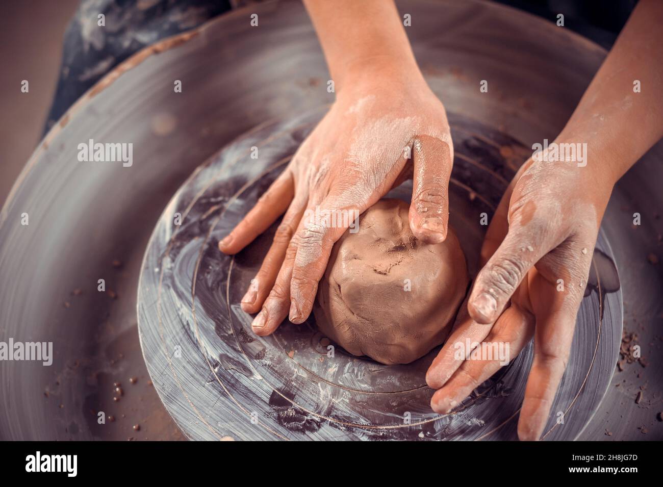 Creating vase of clay close-up. Master crock. The sculptor in the ...