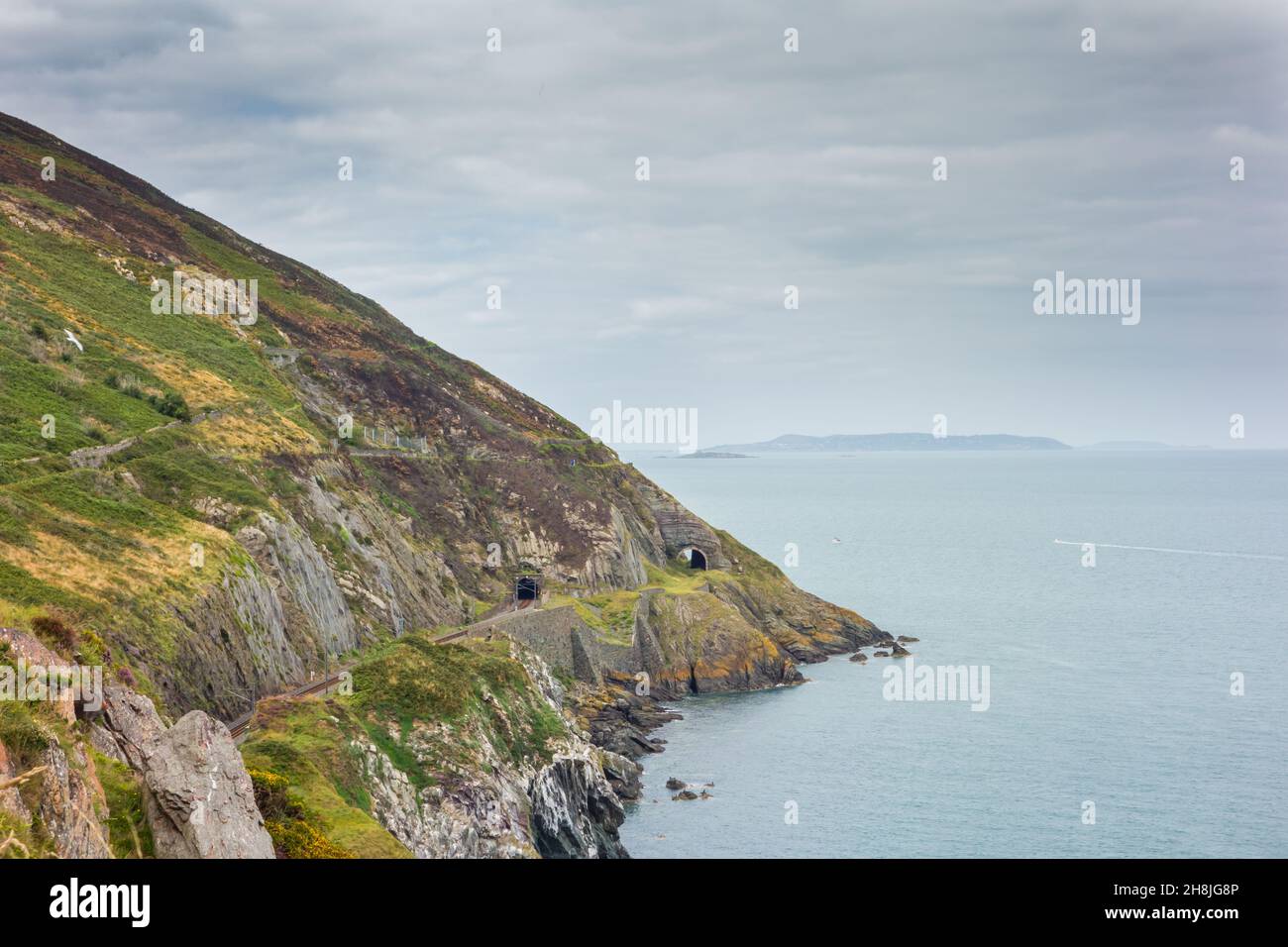 Coastal railway line on the cliffs between Bray and Greystones in ...