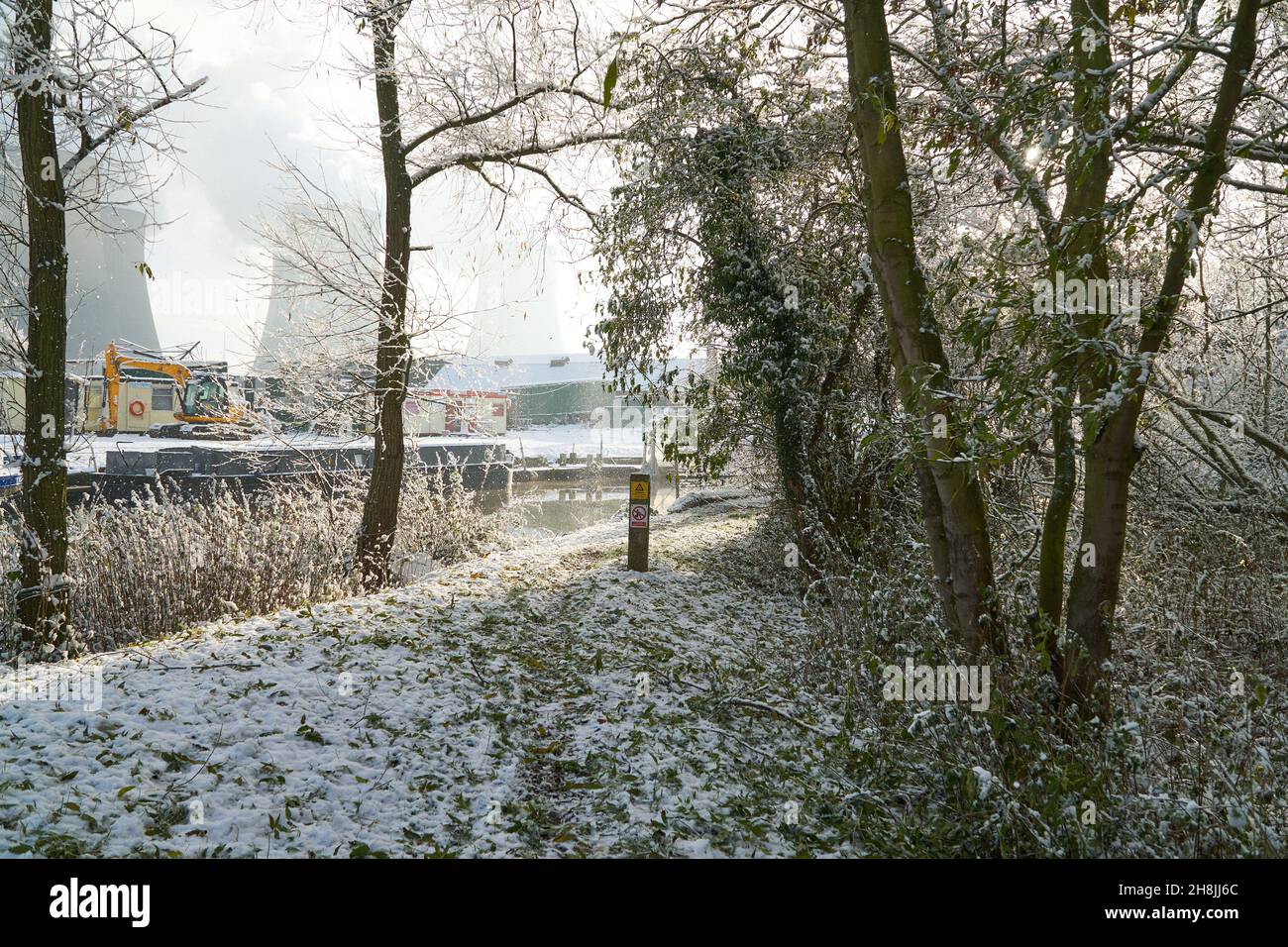 Light snow falling on a canal tow path in winter Stock Photo - Alamy