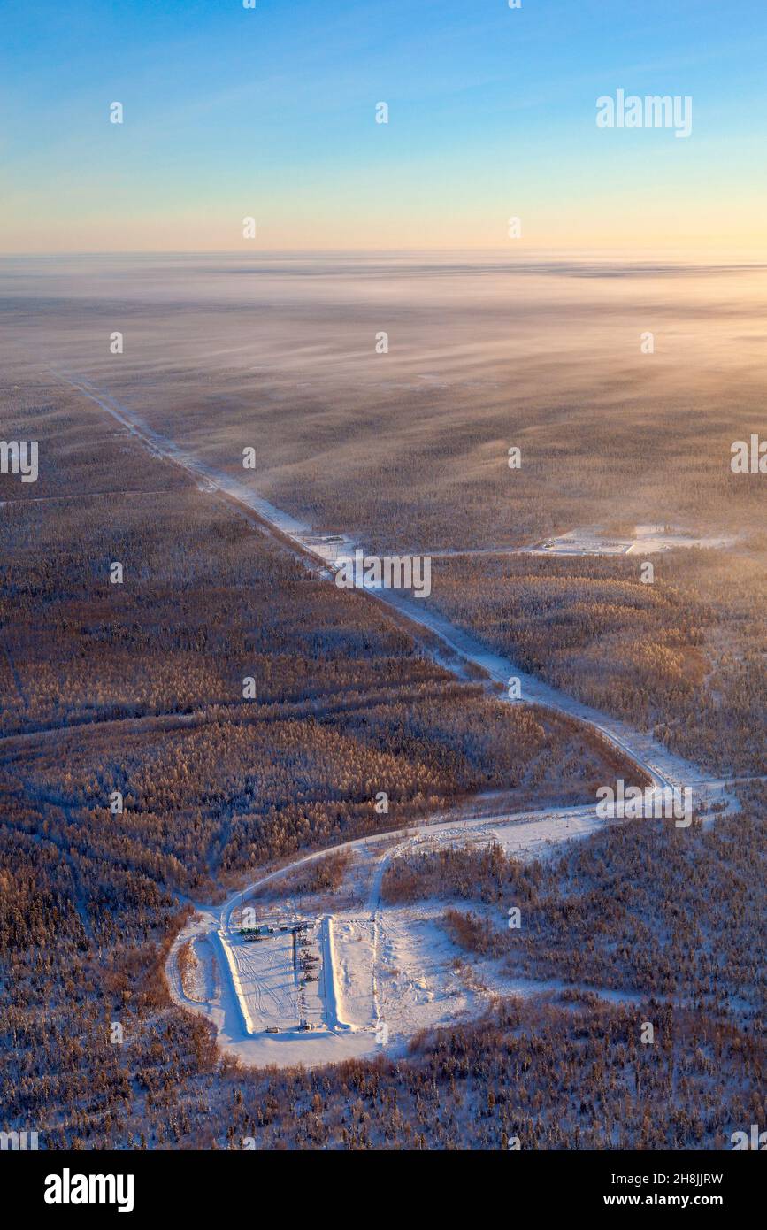 Aerial view of oil rig at an oil field in Western Siberia in the winter ...