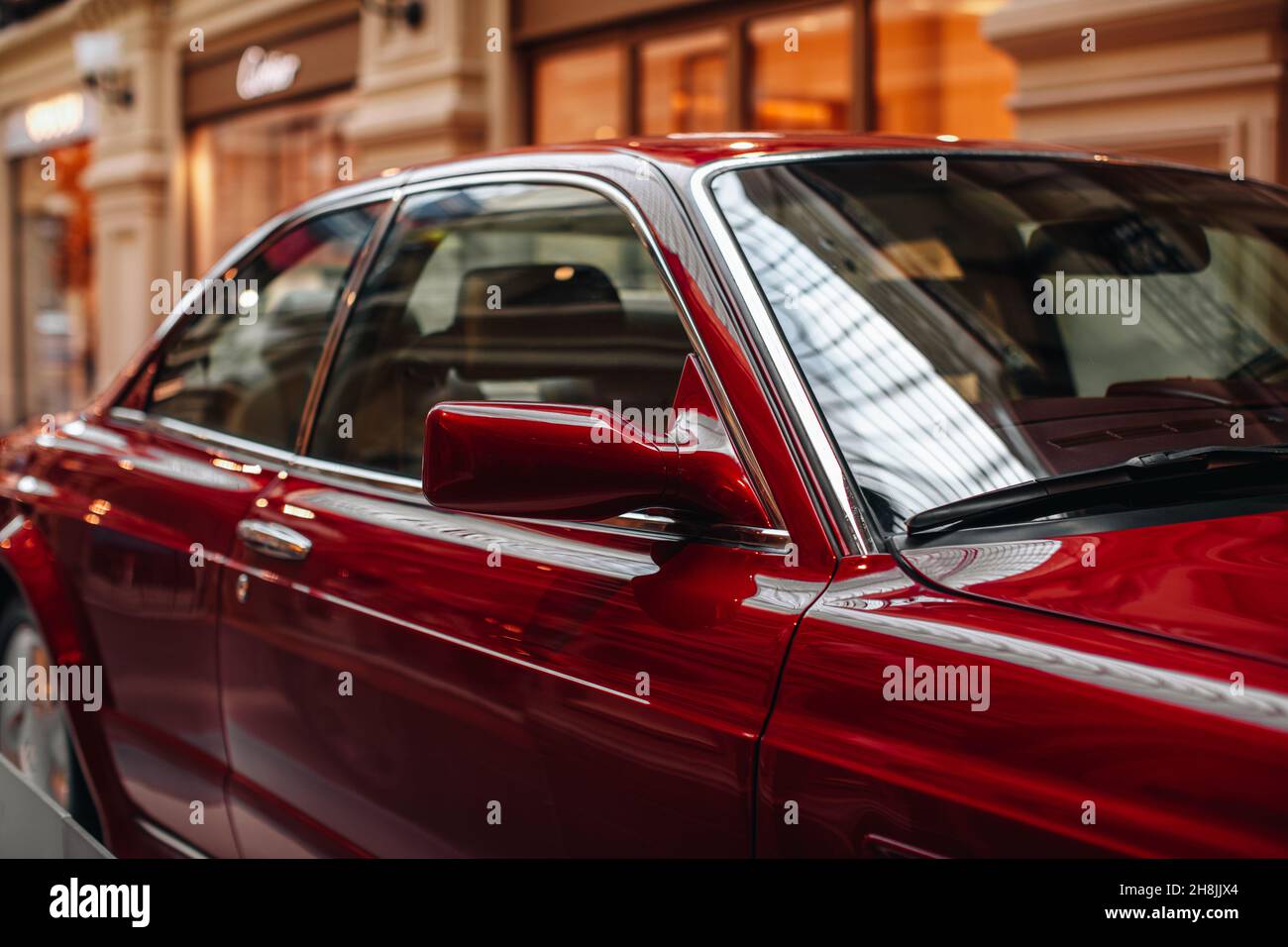 The details of a shiny red Bentley famous vintage car. Luxury ...
