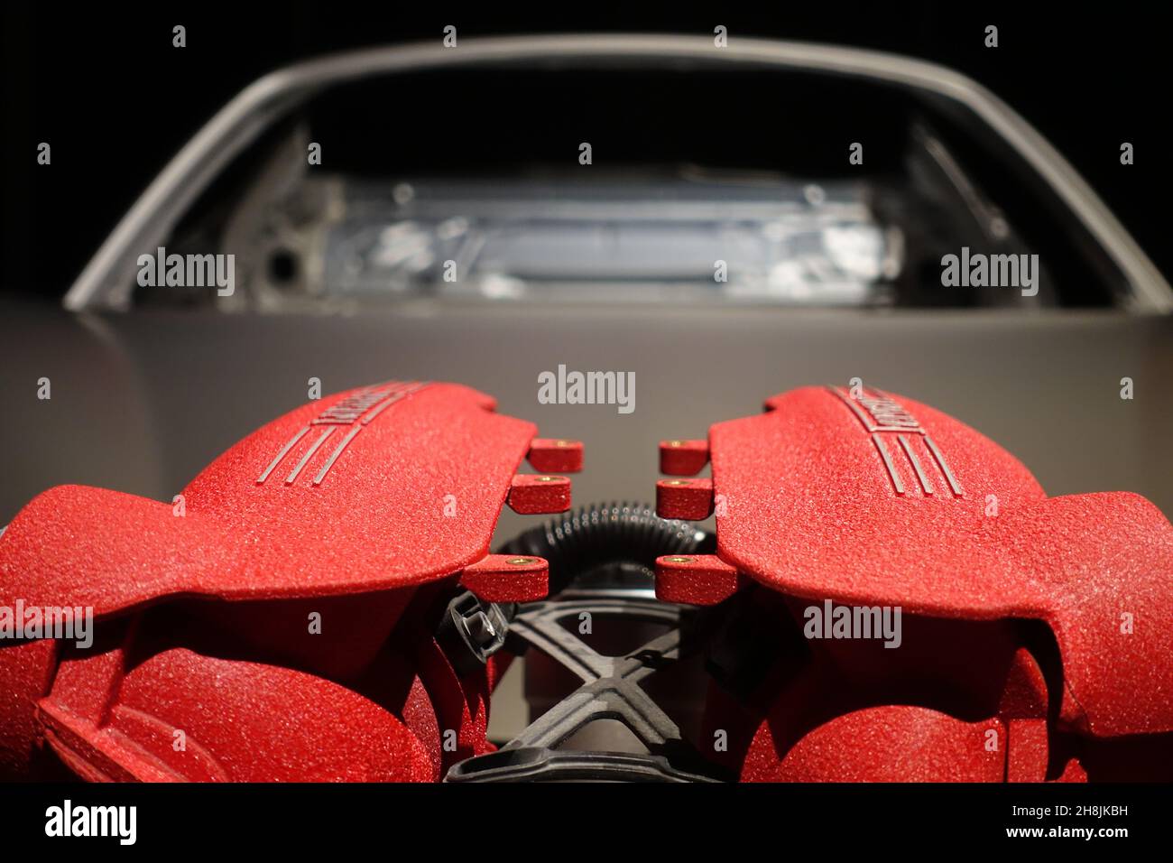 Selective focus shot of a luxury red car engine Stock Photo - Alamy