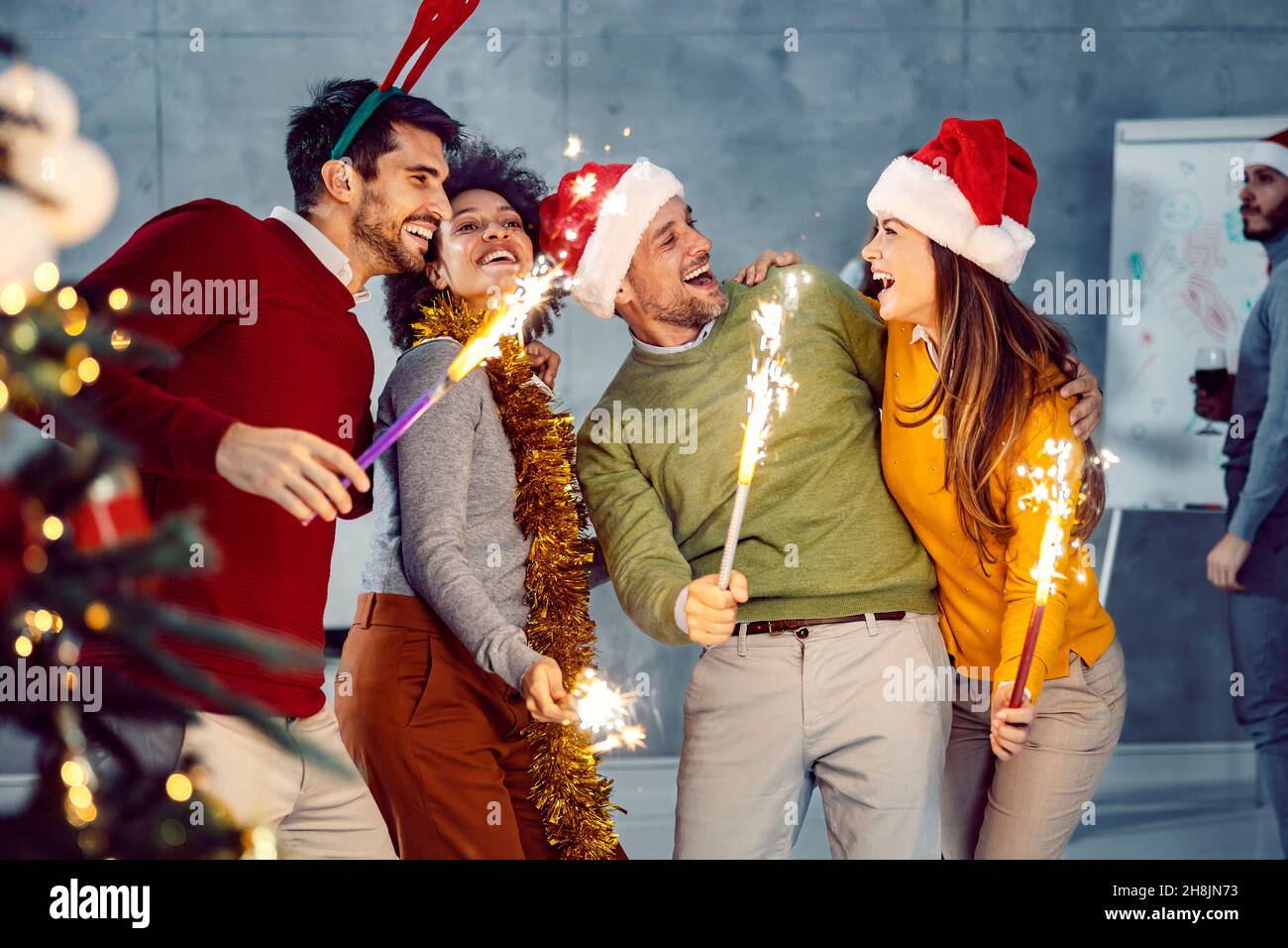 New Year's party in the firm. A group of multicultural colleagues is ...