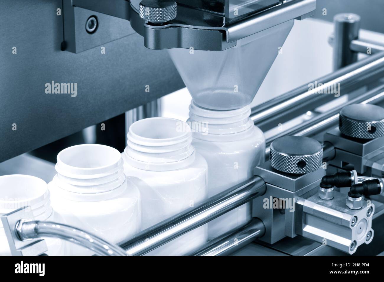 pharmaceutical industry, medicine pills are filling in the bottle on ...