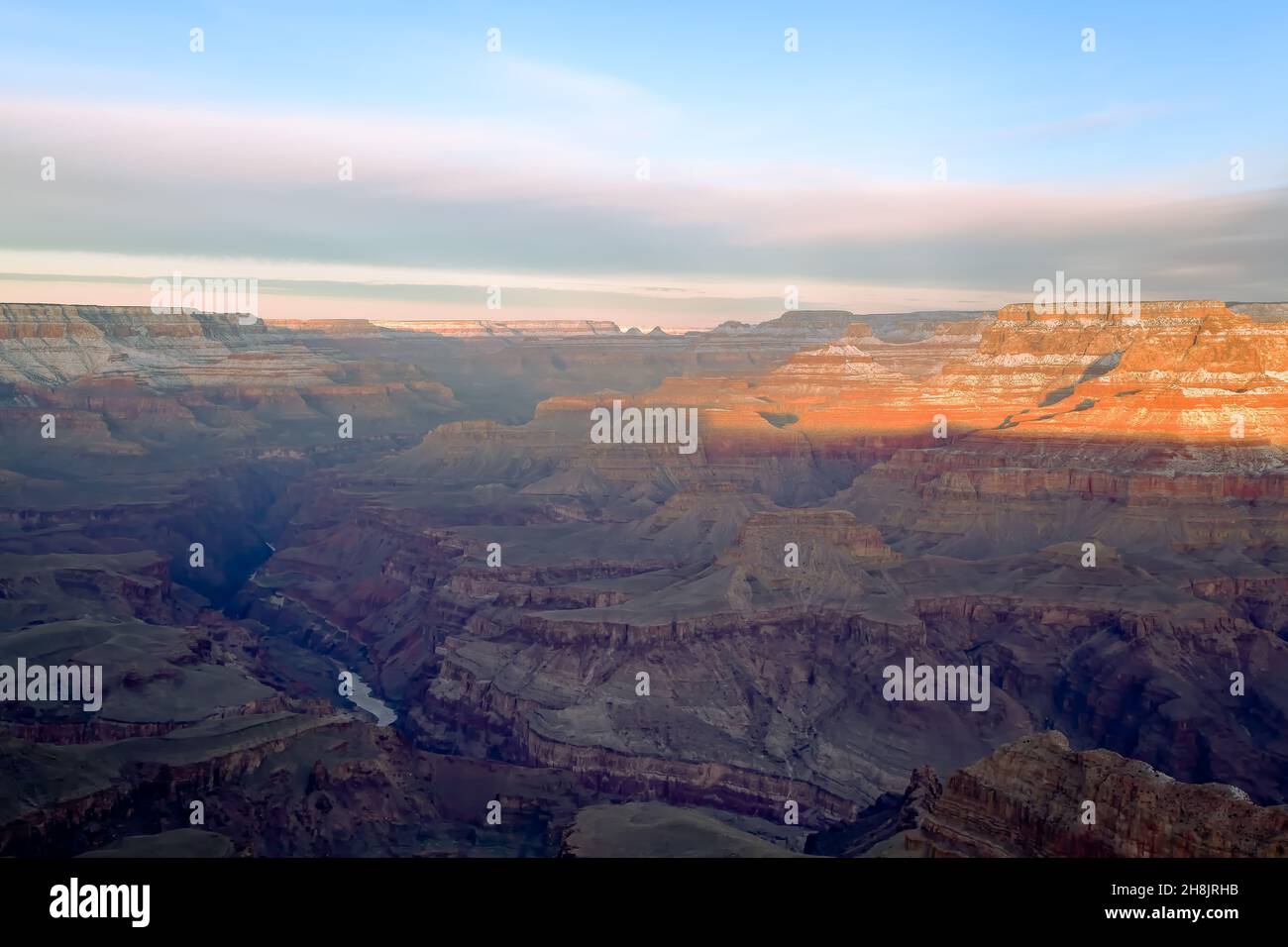 A breathtaking view of the Grand Canyon at sunrise with the vastness of ...