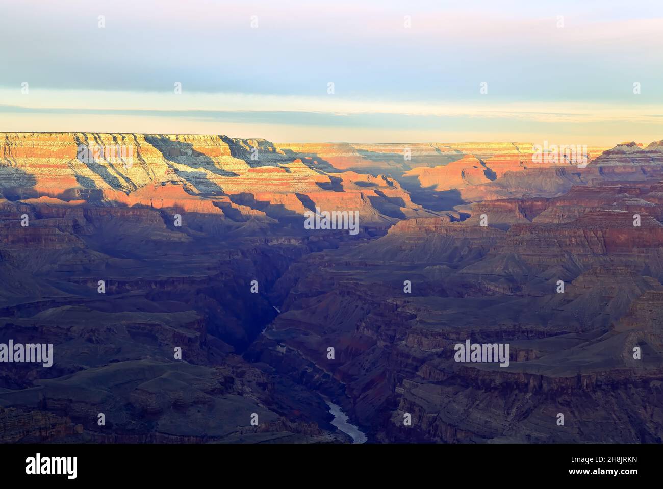 A breathtaking view of the Grand Canyon at sunrise with the vastness of ...