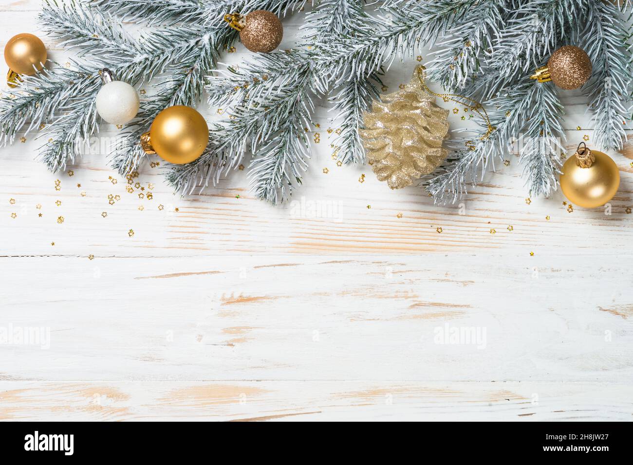 Christmas background with fir tree and golden holiday decorations Stock ...