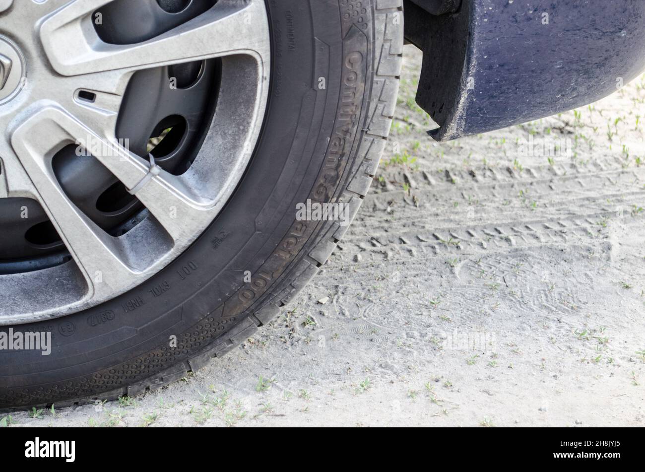 Car wheel and its prints on the ground, conceptual photo. Car wheel ...