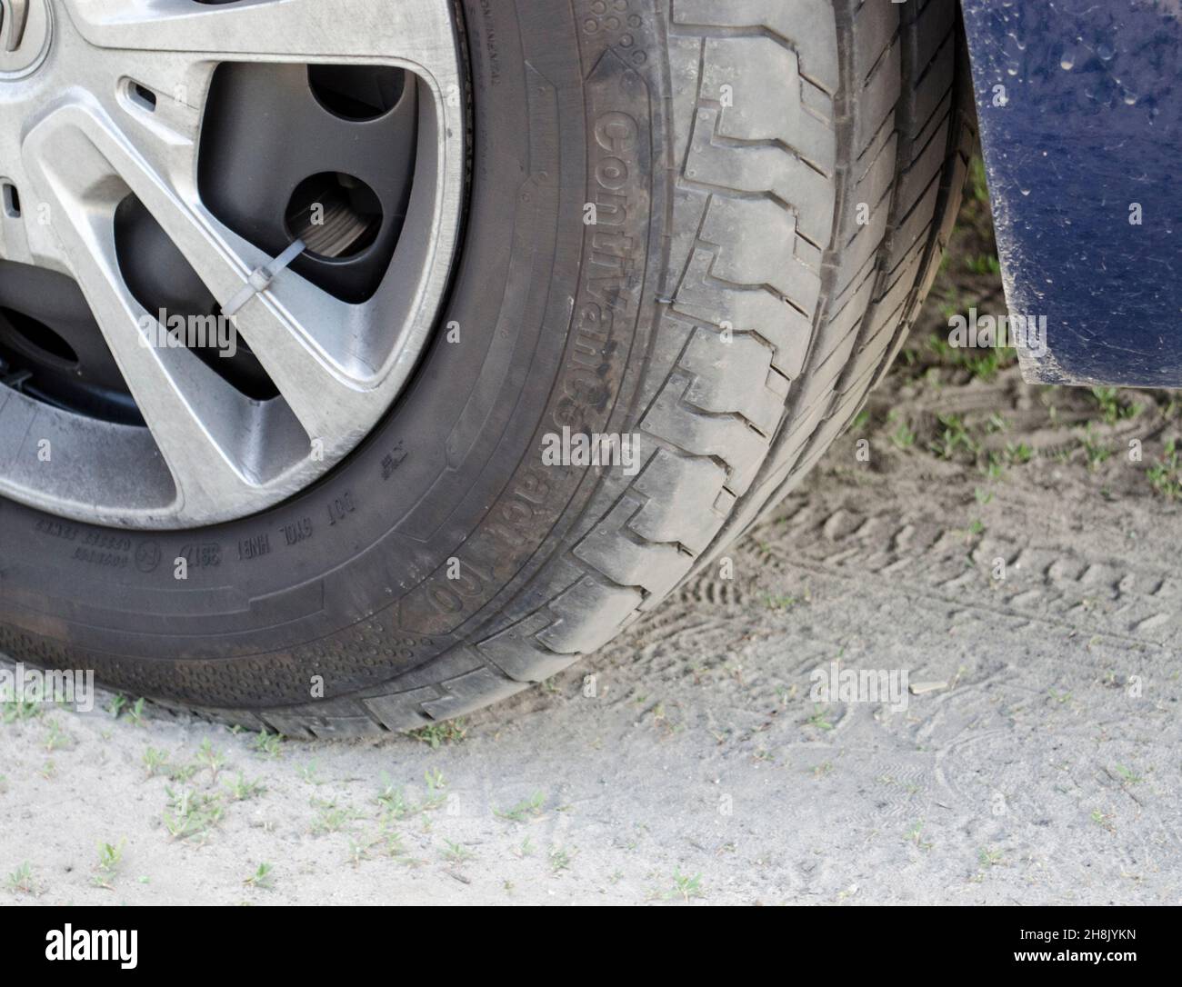 Car wheel close view, dirty wheel photo Stock Photo - Alamy