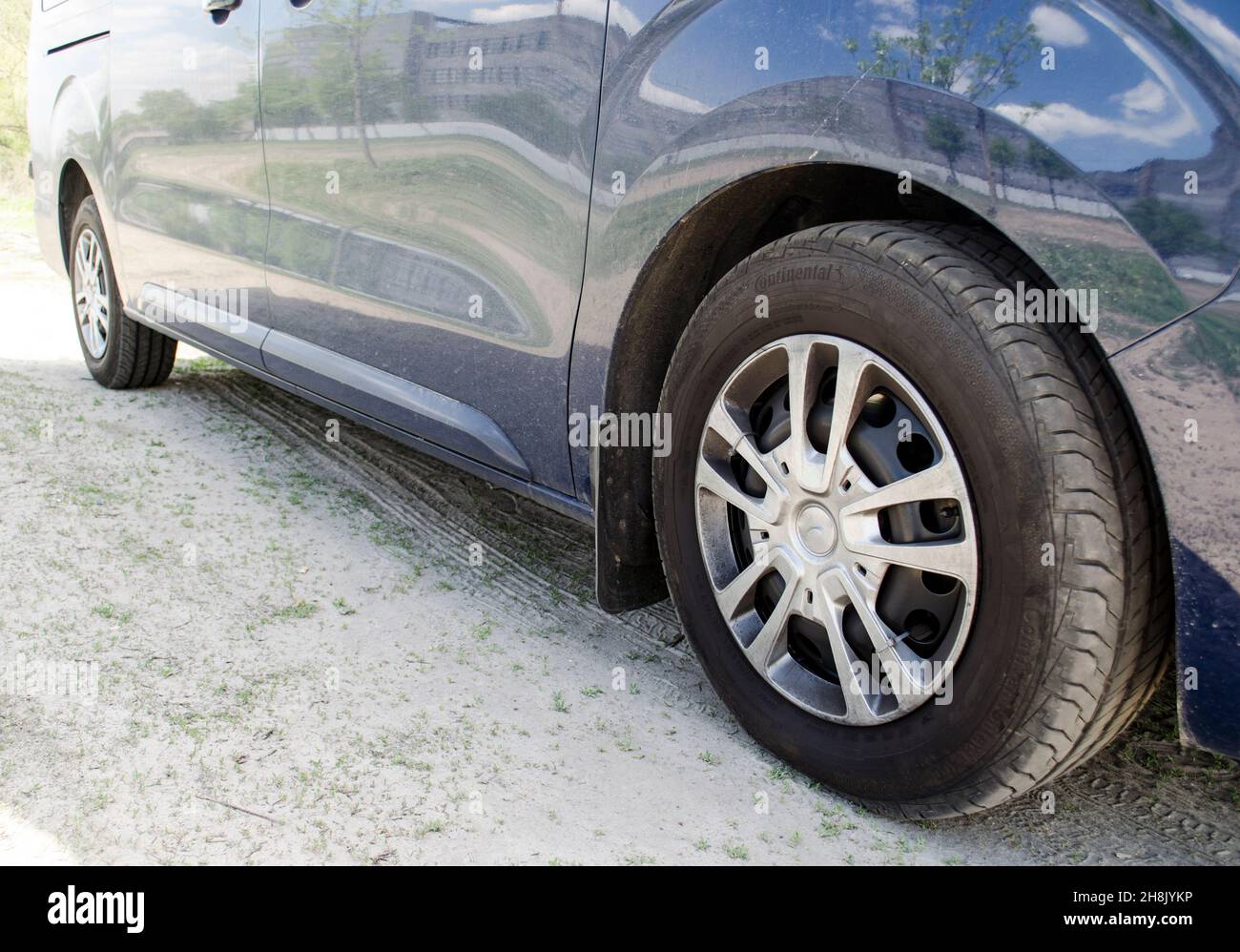 Car wheels close view, dirty natural wheelы photo Stock Photo - Alamy