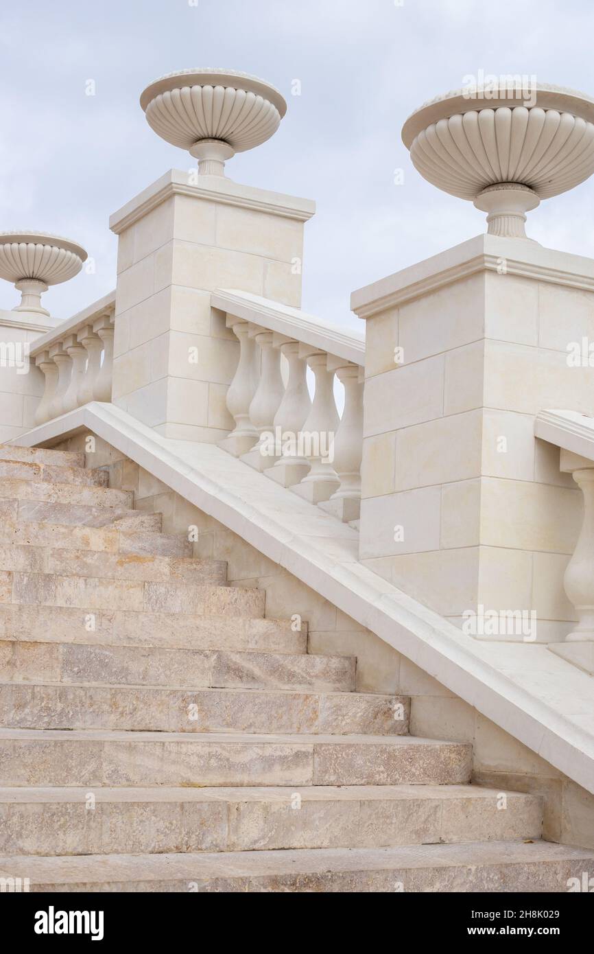 White staircase with columns leading up. Architecture and construction ...