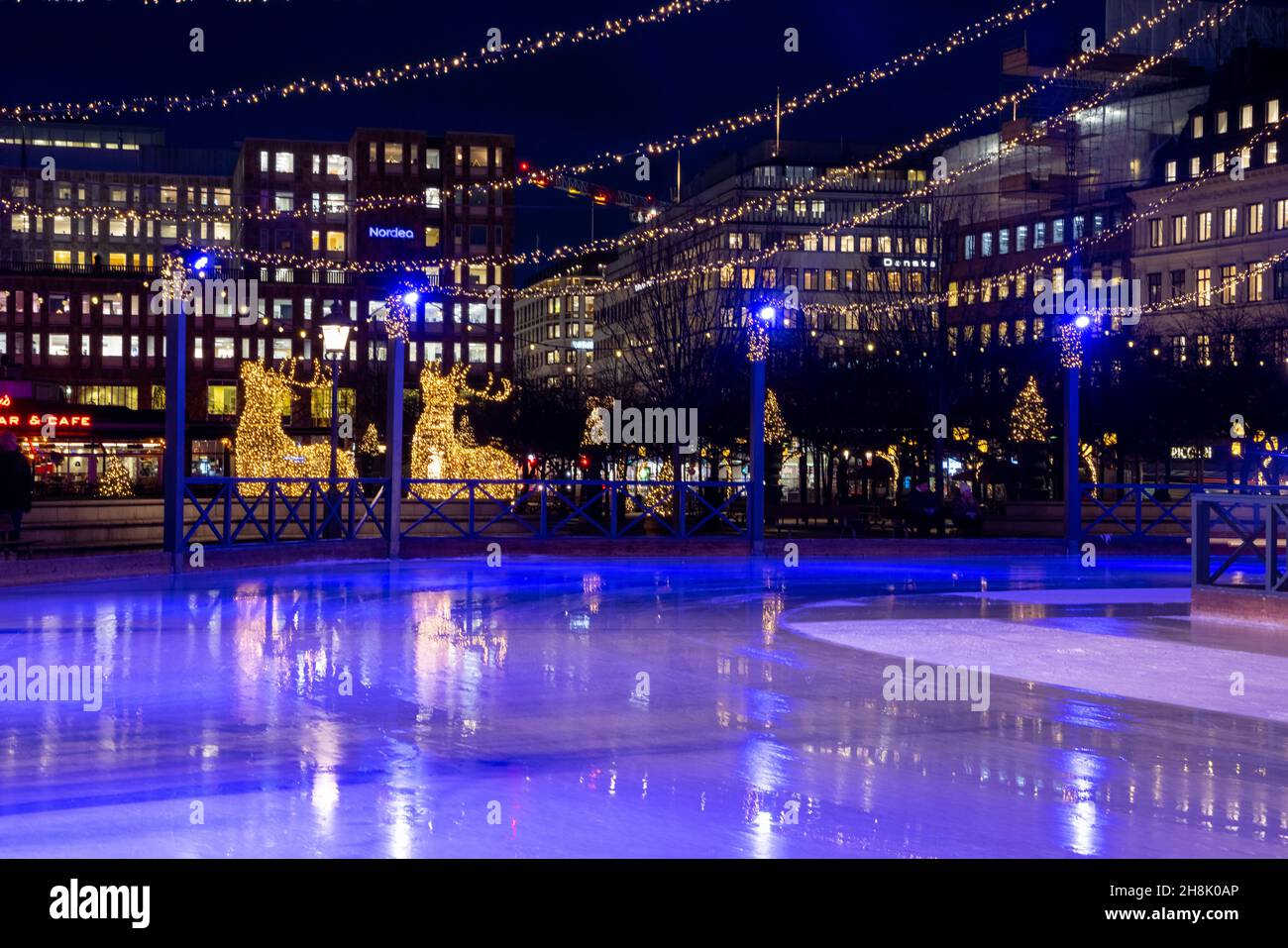 Winter in Stockholm. Ice skating in the square in Kungstradgarden Stock ...