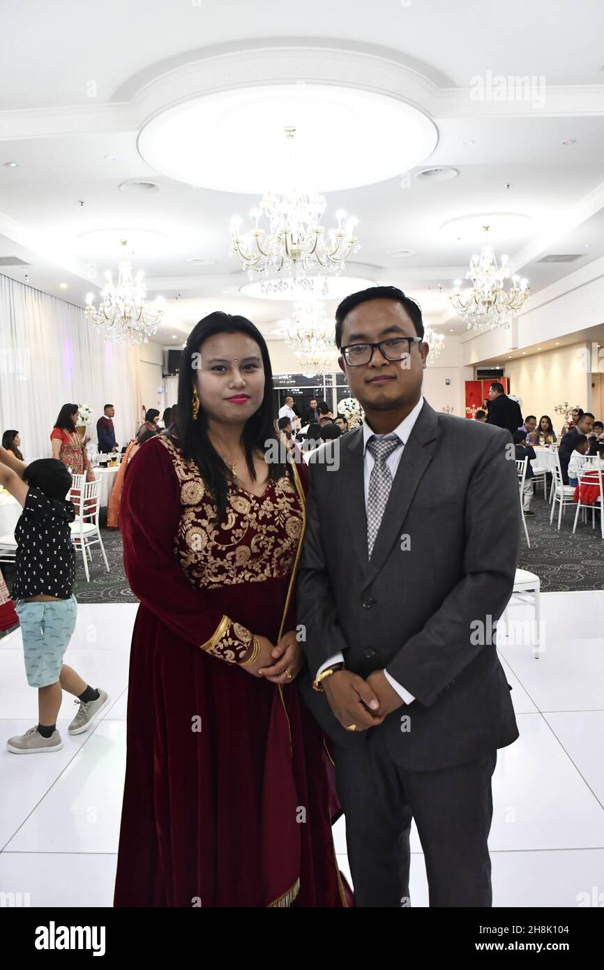 Portrait of a beautiful woman in a traditional costume with a man in ...
