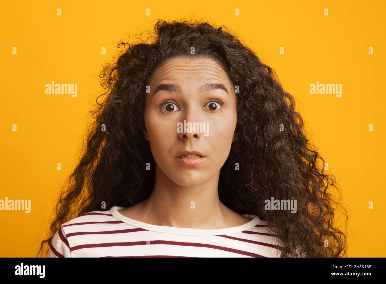 Human Emotions. Portrait Of Dazed Young Woman Looking At Camera With ...