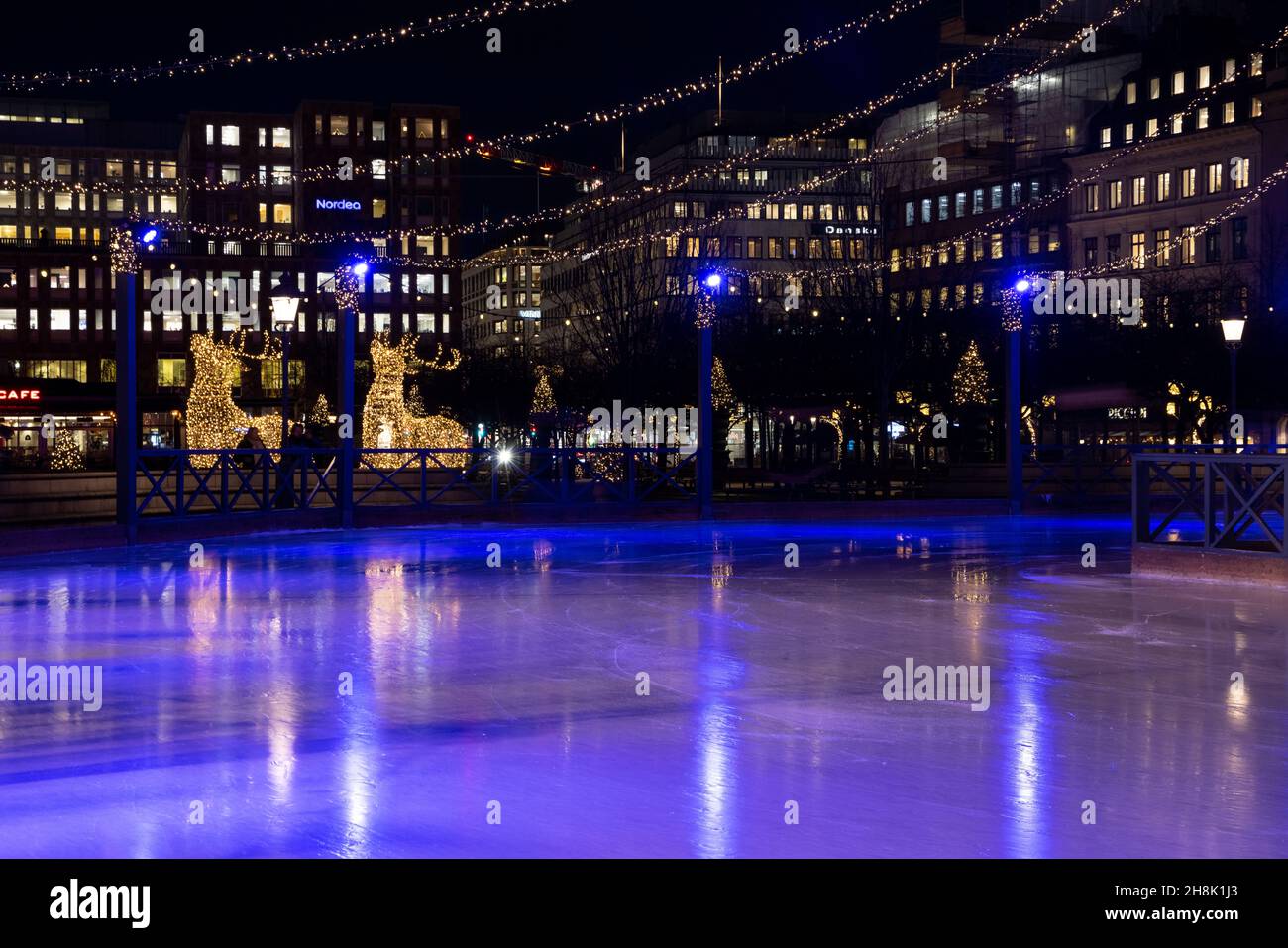 Winter in Stockholm. Ice skating in the square in Kungstradgarden Stock ...