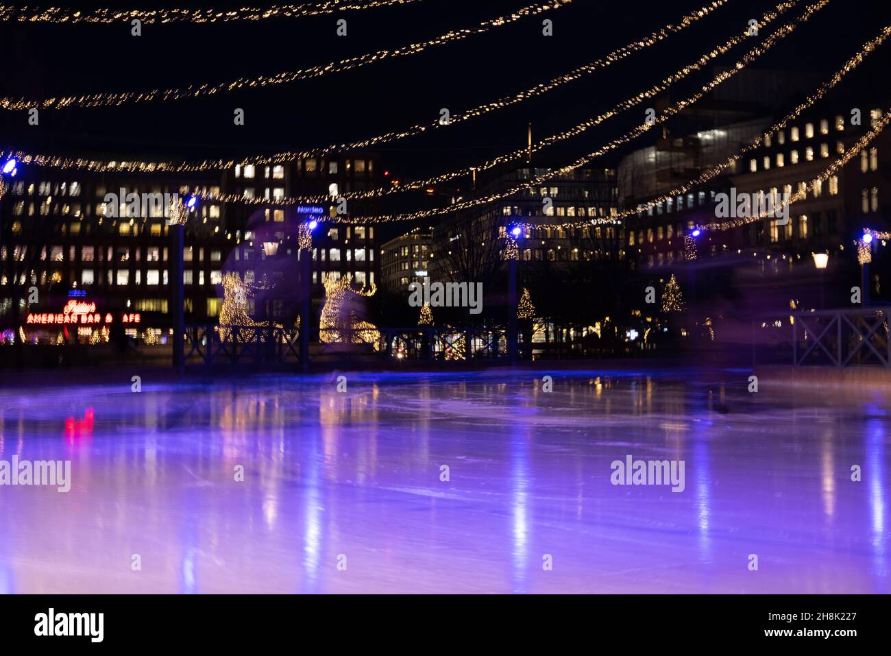 Winter in Stockholm. Ice skating in the square in Kungstradgarden Stock ...