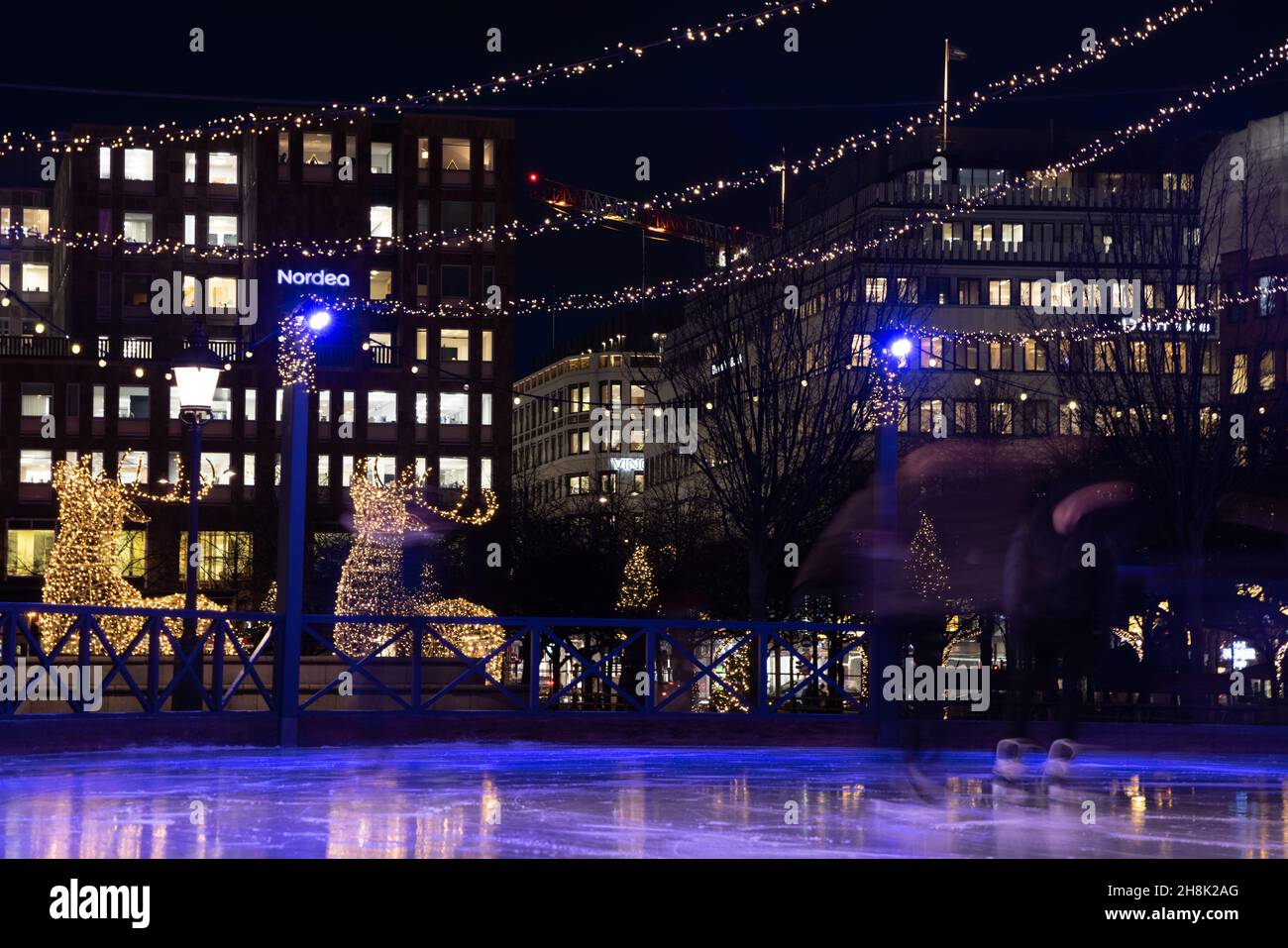 Winter in Stockholm. Ice skating in the square in Kungstradgarden Stock ...
