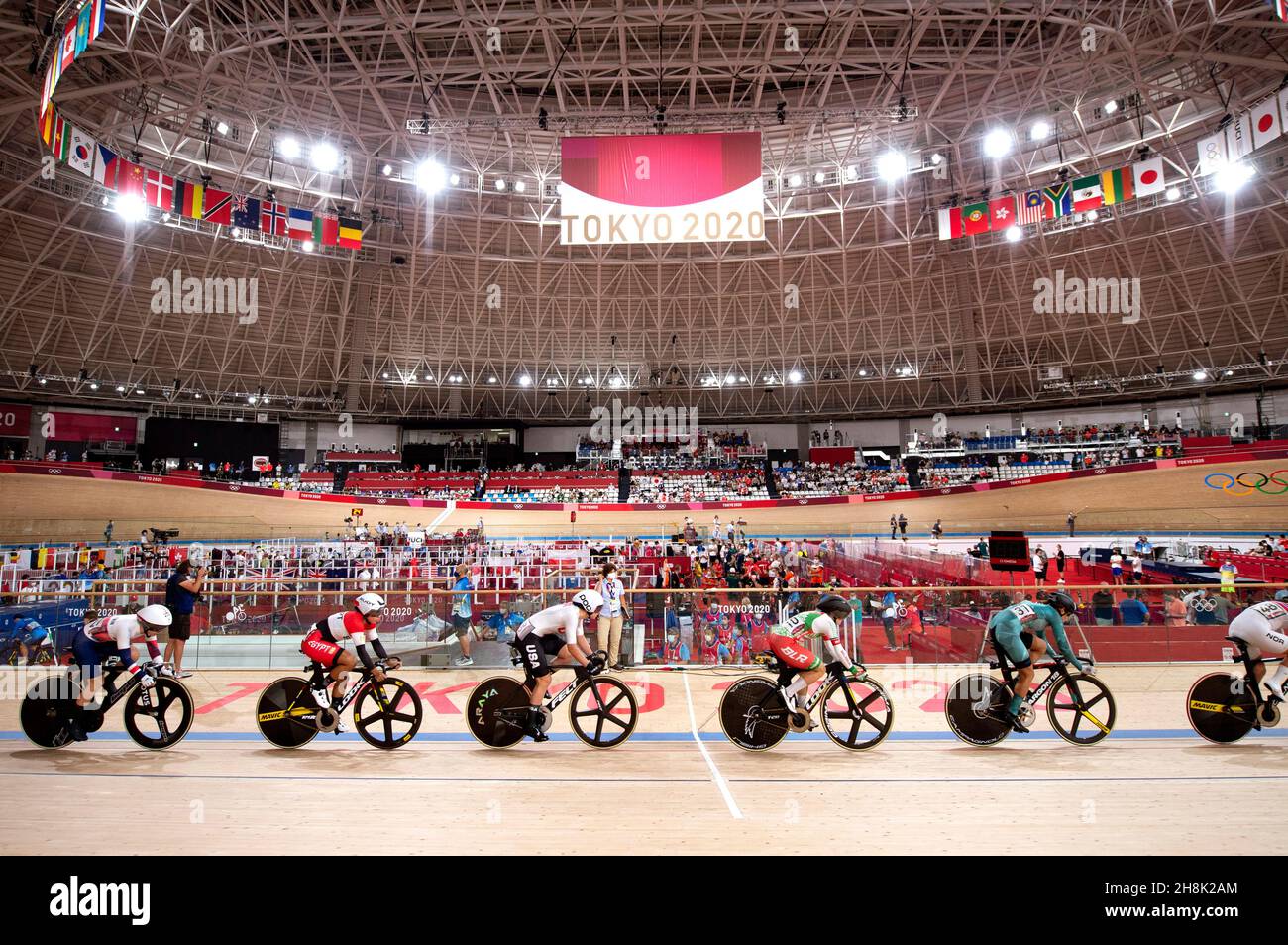 Jennifer Valente of the United States rides in the scratch race, part ...