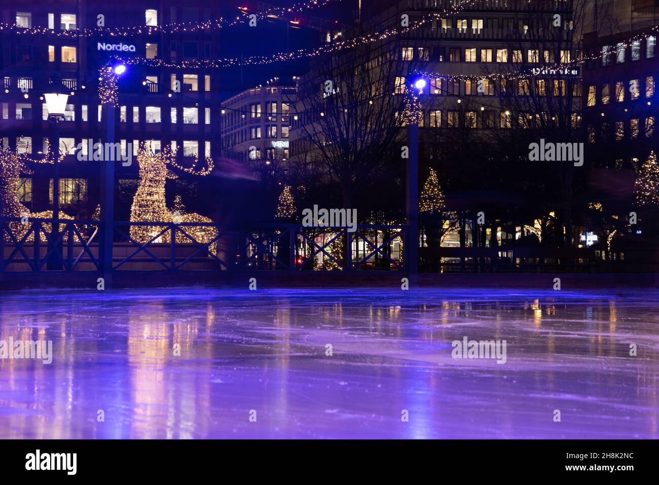 Winter in Stockholm. Ice skating in the square in Kungstradgarden Stock ...