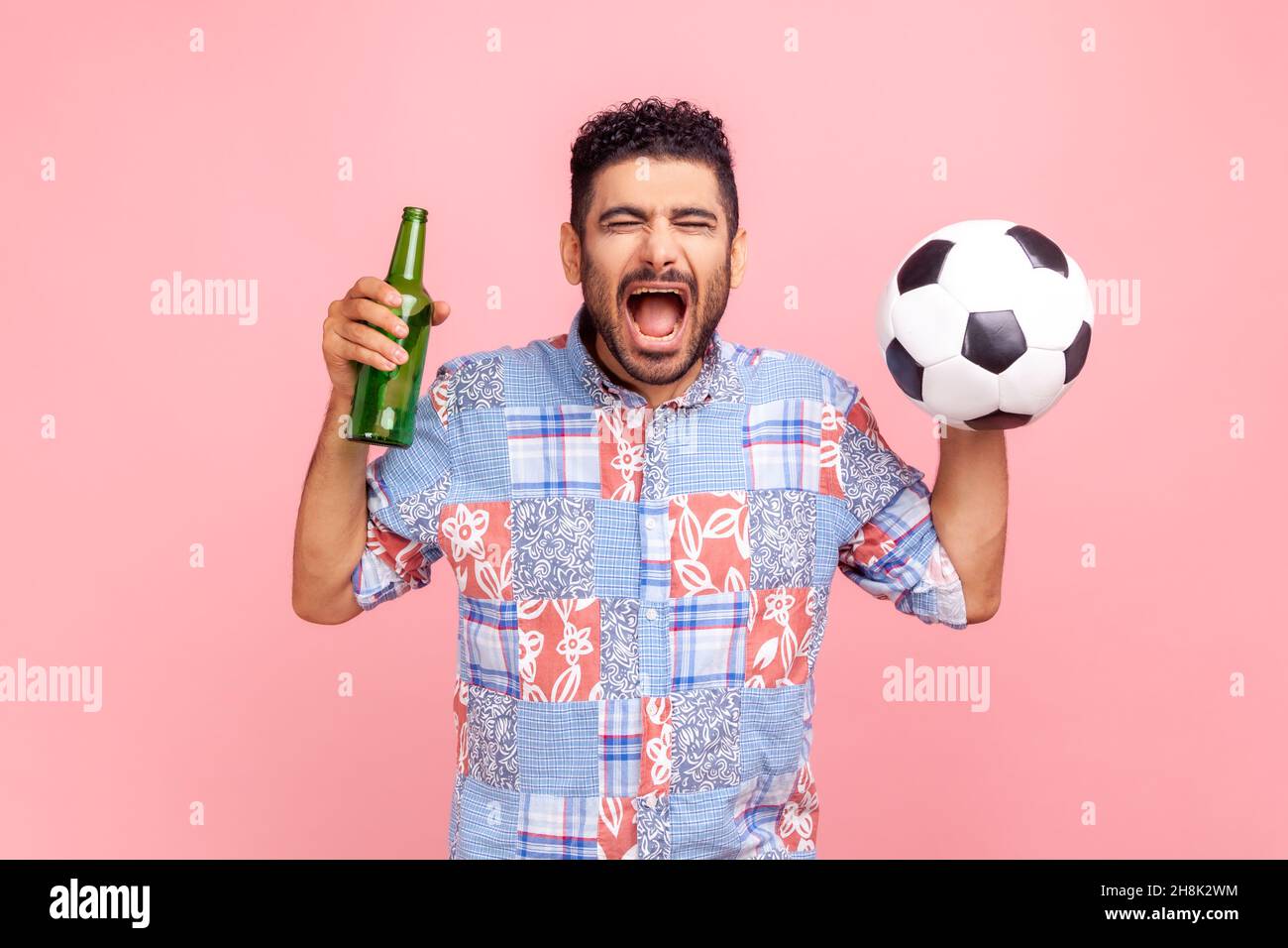 Crazy fan man wearing blue casual style shirt screaming happily ...