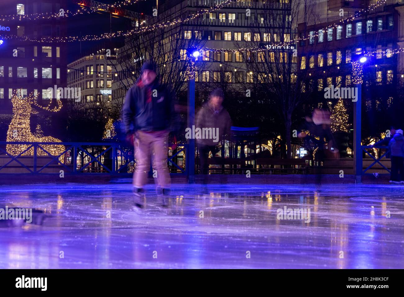 Winter in Stockholm. Ice skating in the square in Kungstradgarden Stock ...