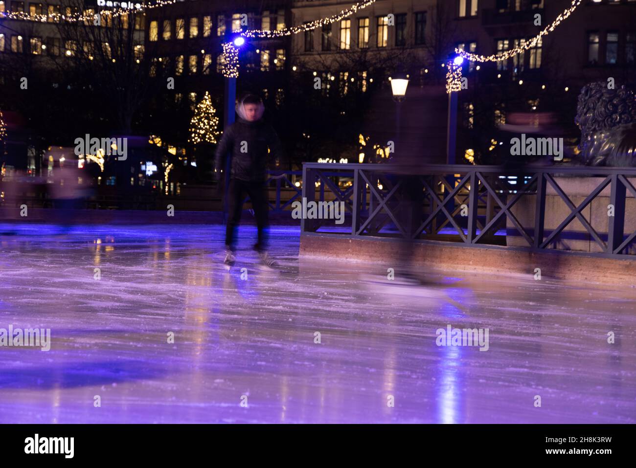Winter in Stockholm. Ice skating in the square in Kungstradgarden Stock ...