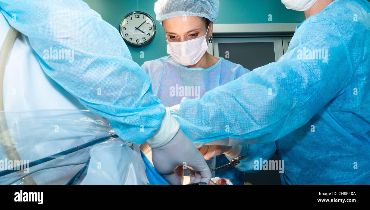 Clock on wall in operating room hi-res stock photography and images - Alamy