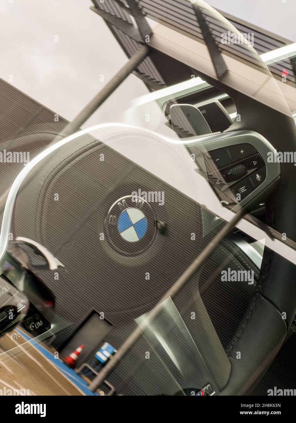 View through window of new luxury BMW car steering wheel Stock Photo ...