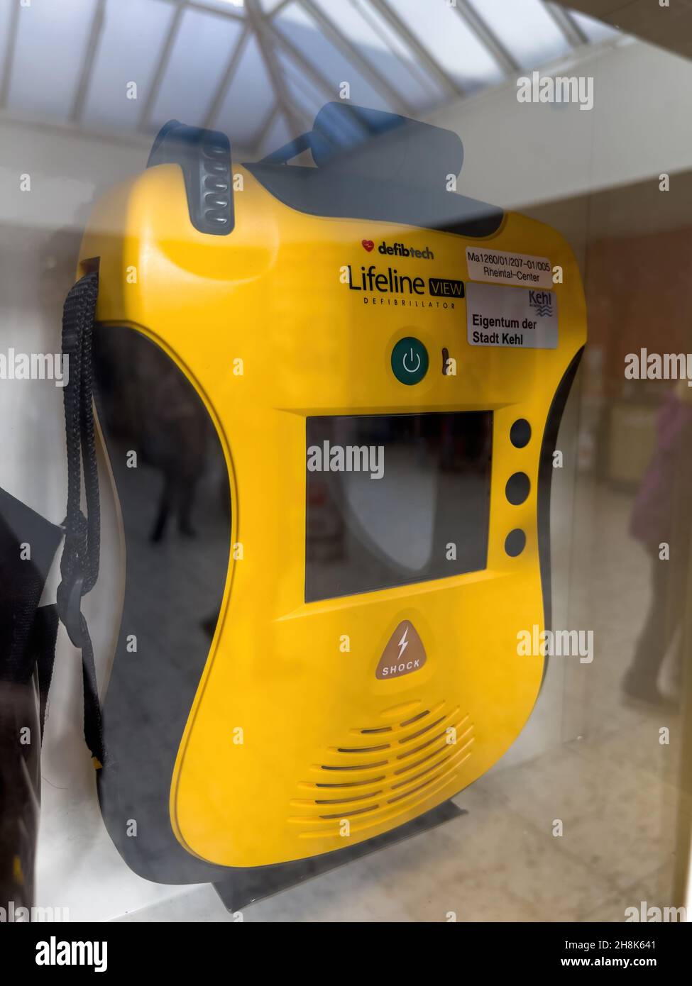 New yellow DefibTech Lifeline defibrillator in large mall Stock Photo ...