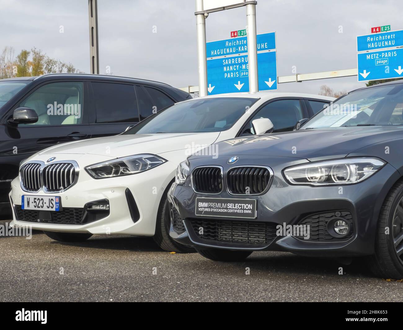 ront view of new luxury BMW cars parked outside dealership Stock Photo ...
